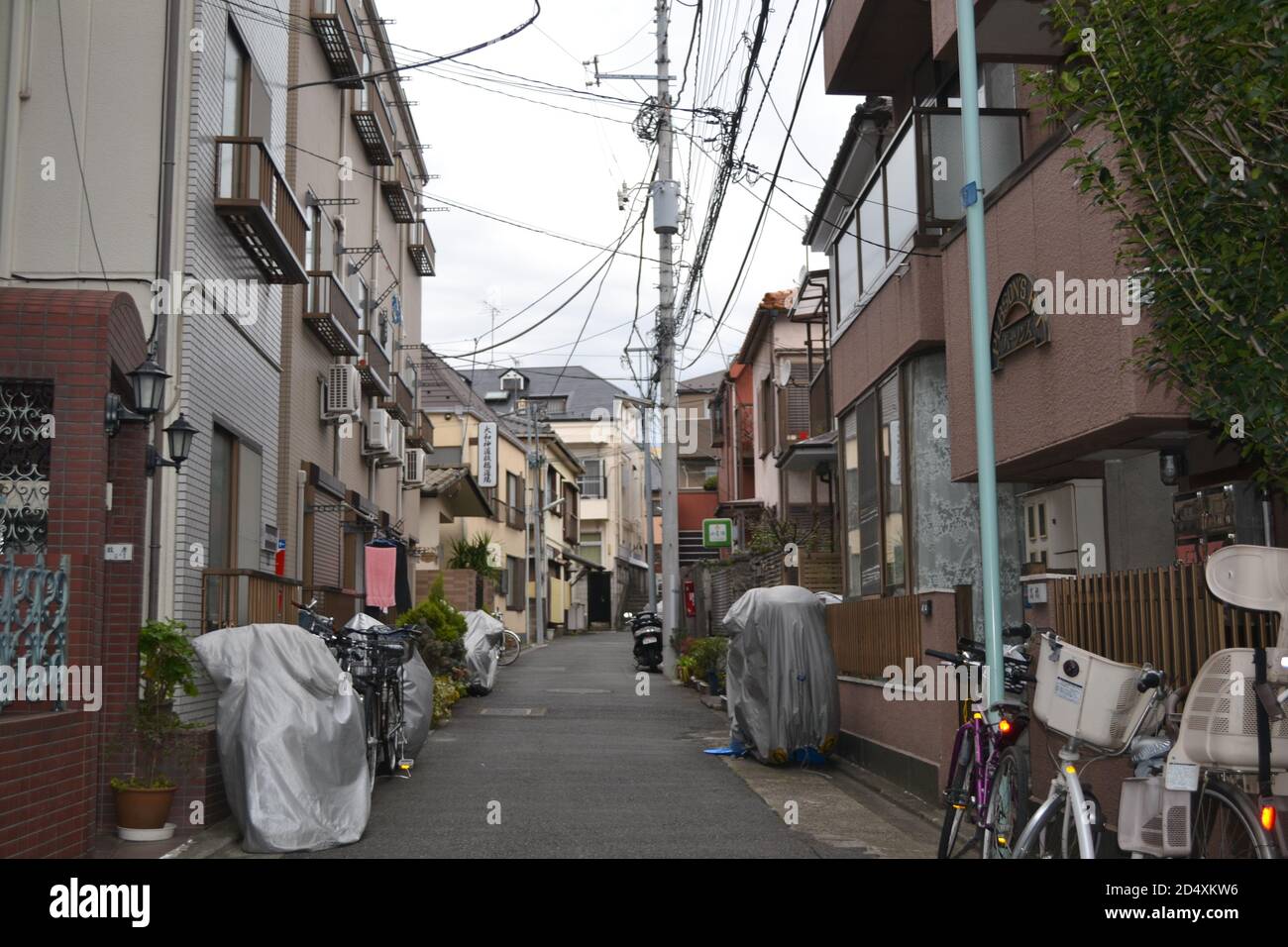 Itabashi-Tokyo,Japan-2/22/16: Down a condensed residential alleyway in ...