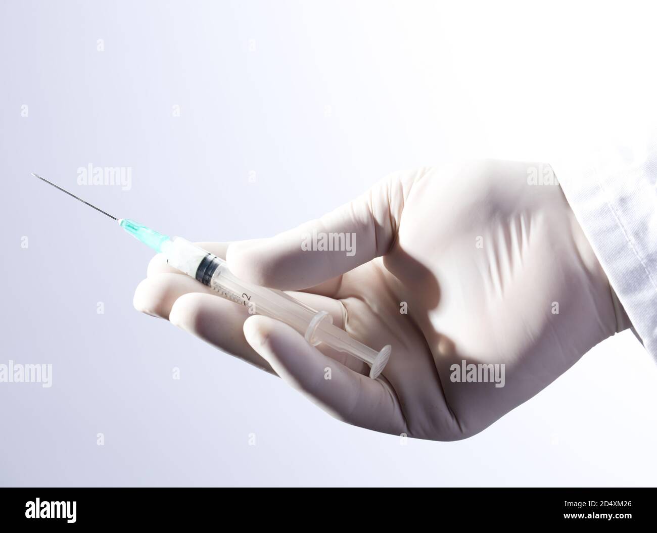 Syringe, medical injection in the hand, palm or fingers. Plastic ...