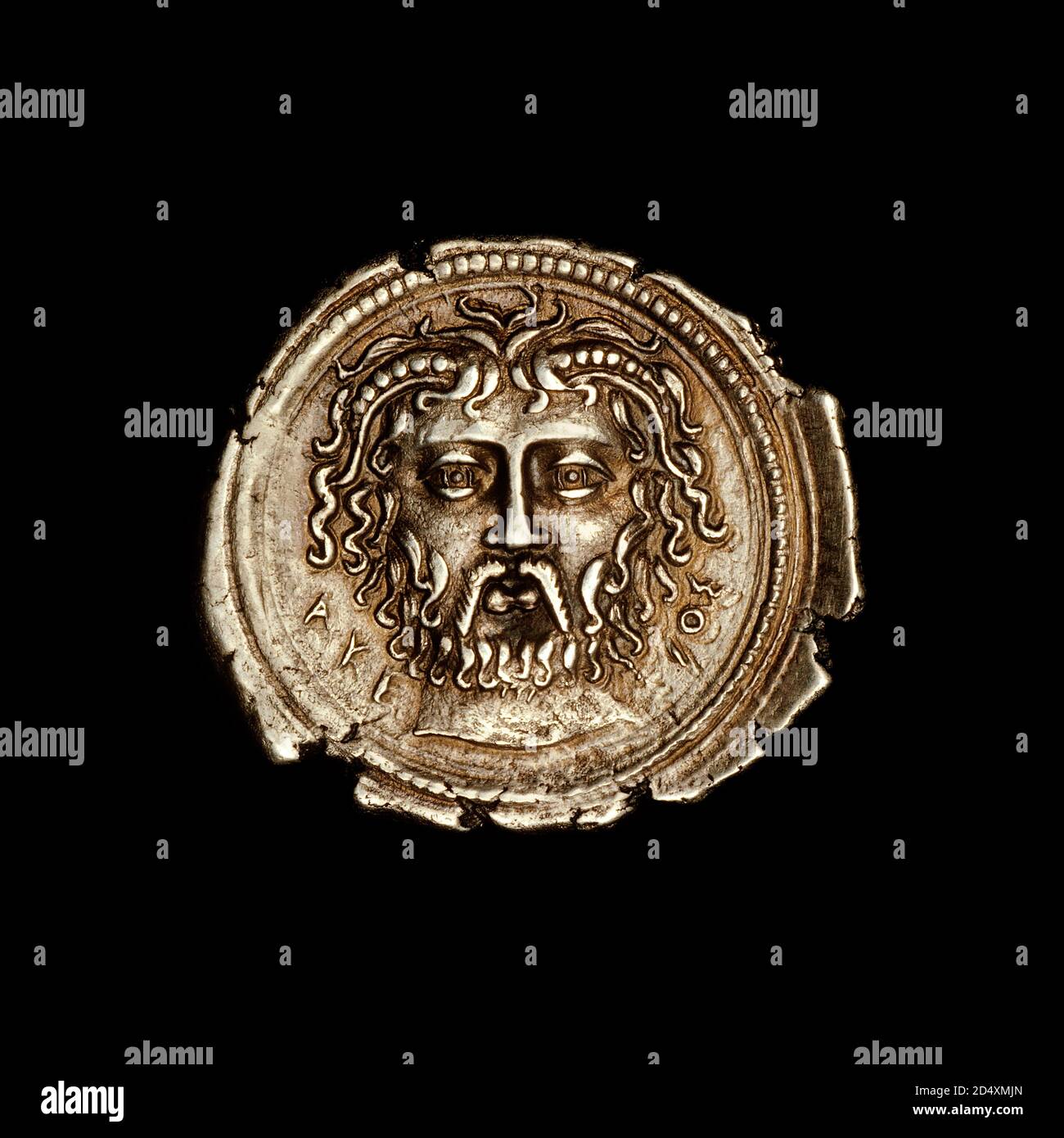 Ancient Greek Coin with Facing Head of Zeus, Circa 360BC Stock Photo ...