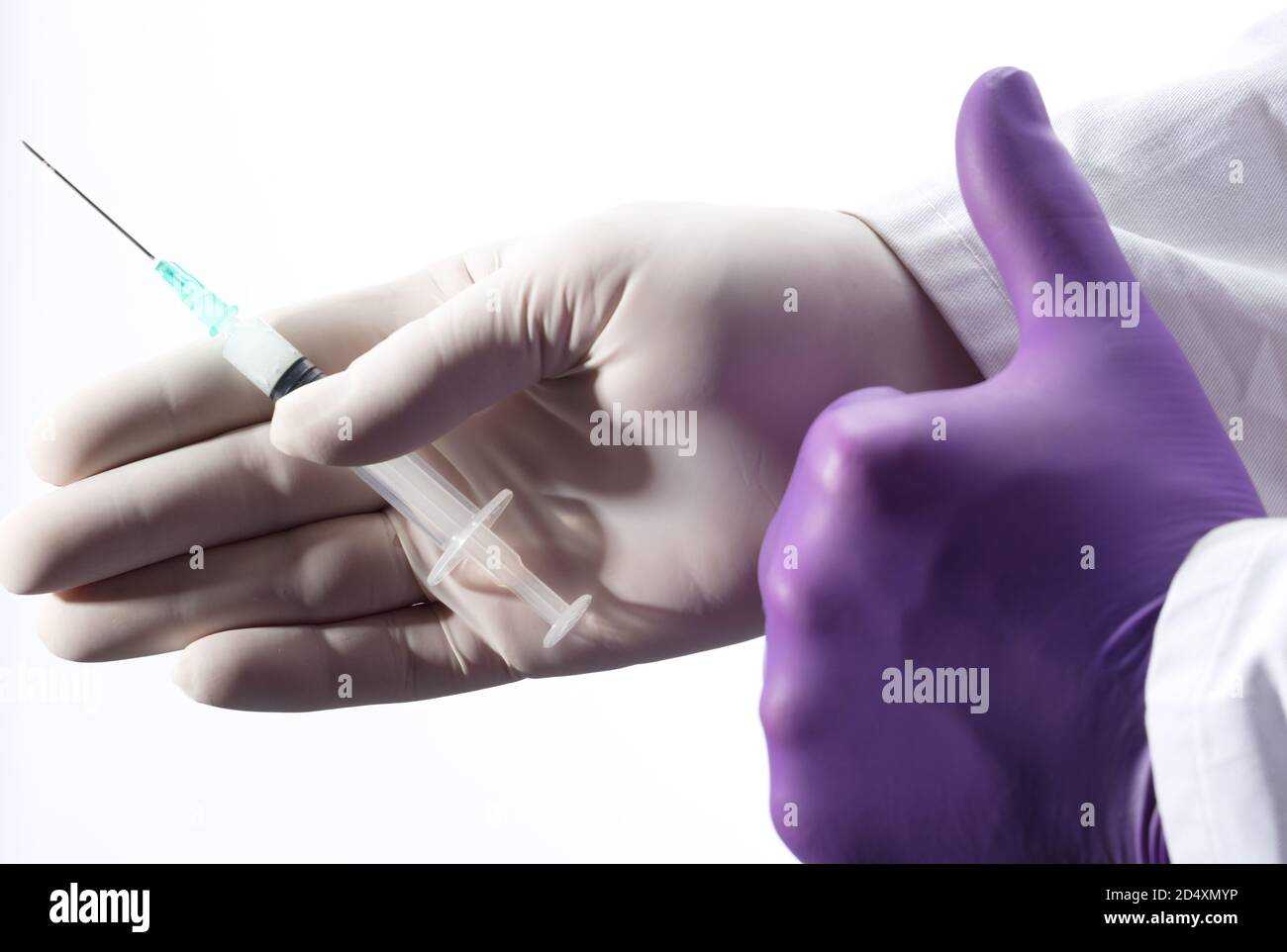 Syringe, medical injection in the hand, palm or fingers. Plastic ...