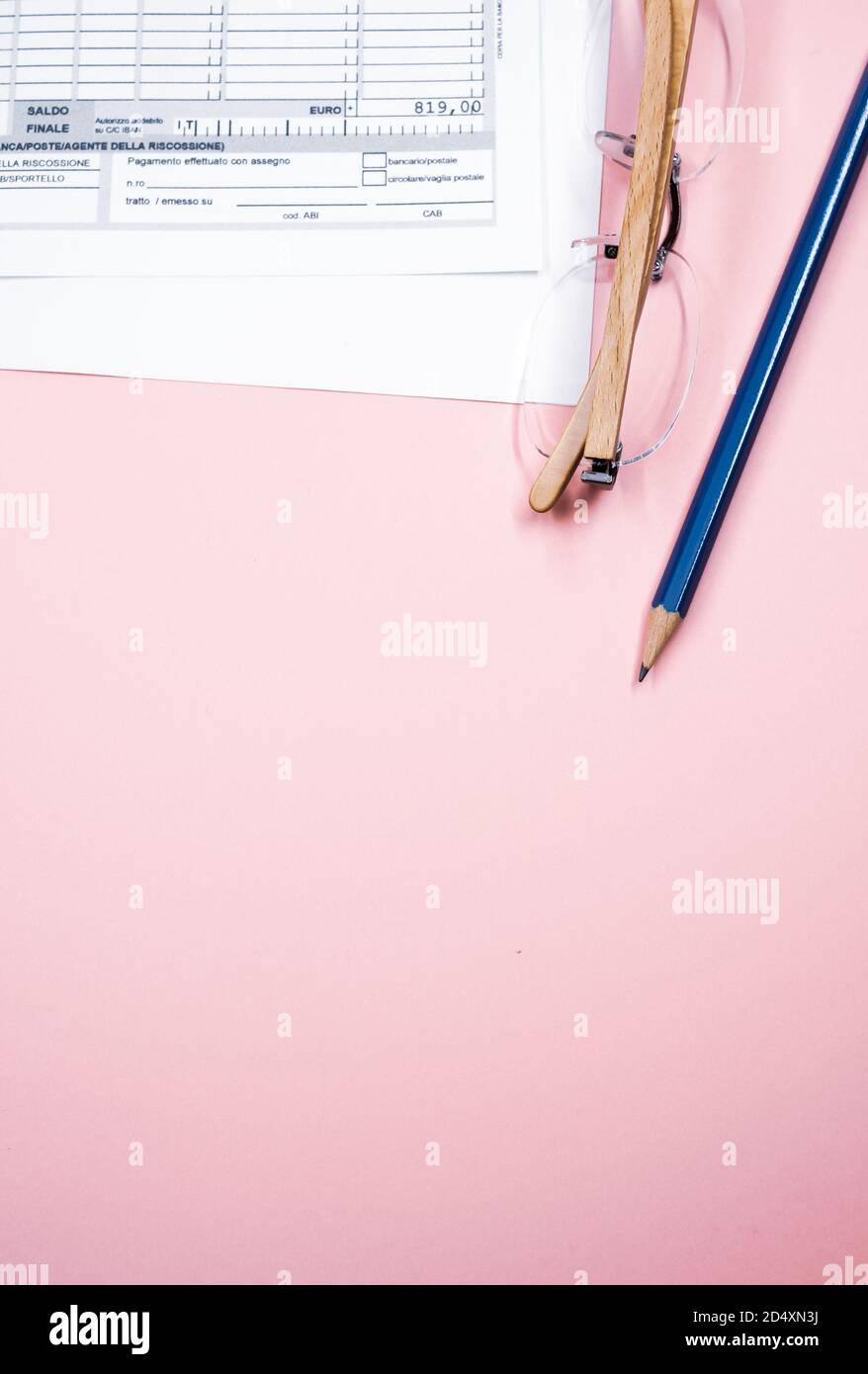 Form paper and a pencil on a pink background Stock Photo - Alamy