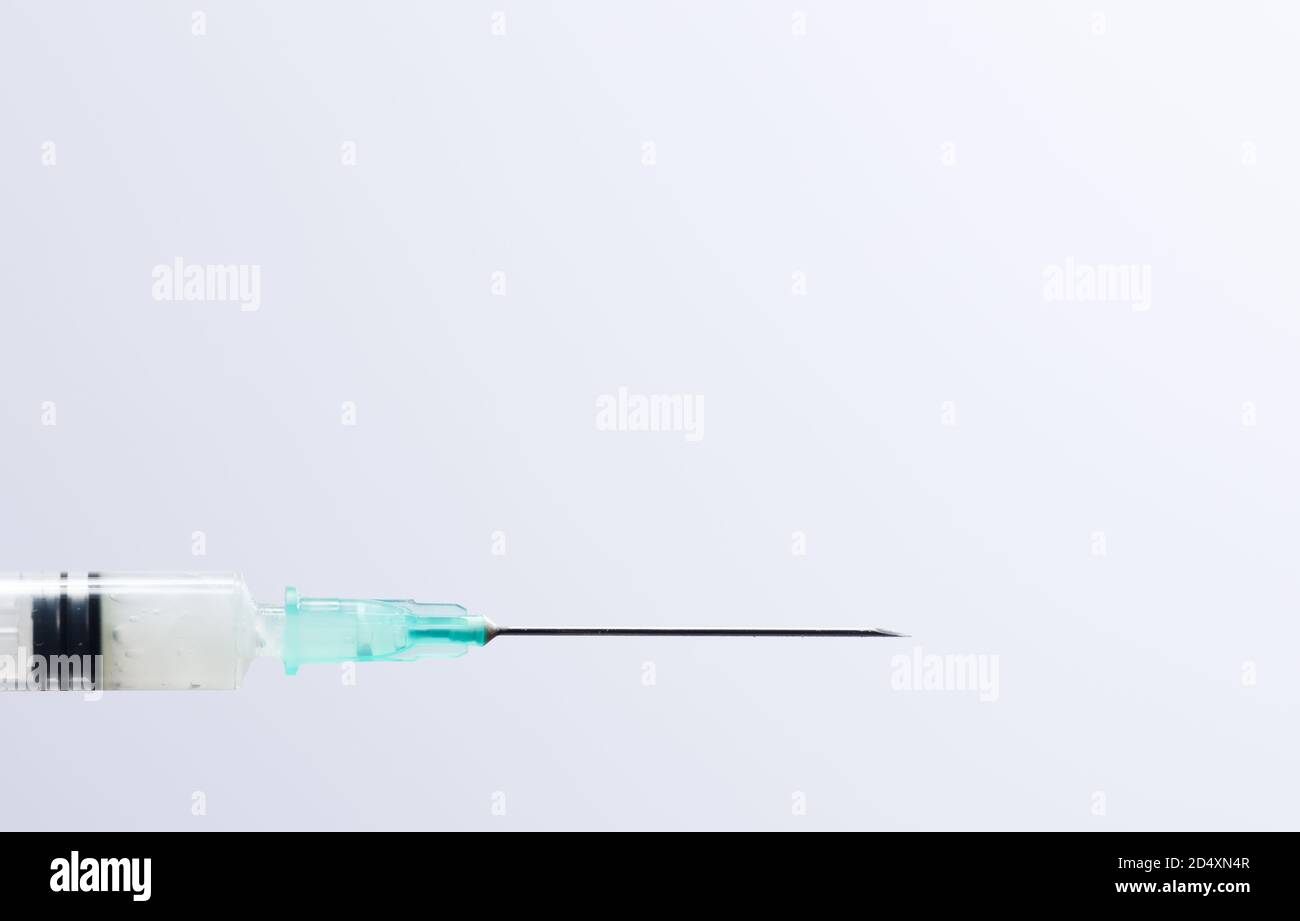 medical syringe cannula with white background Stock Photo - Alamy
