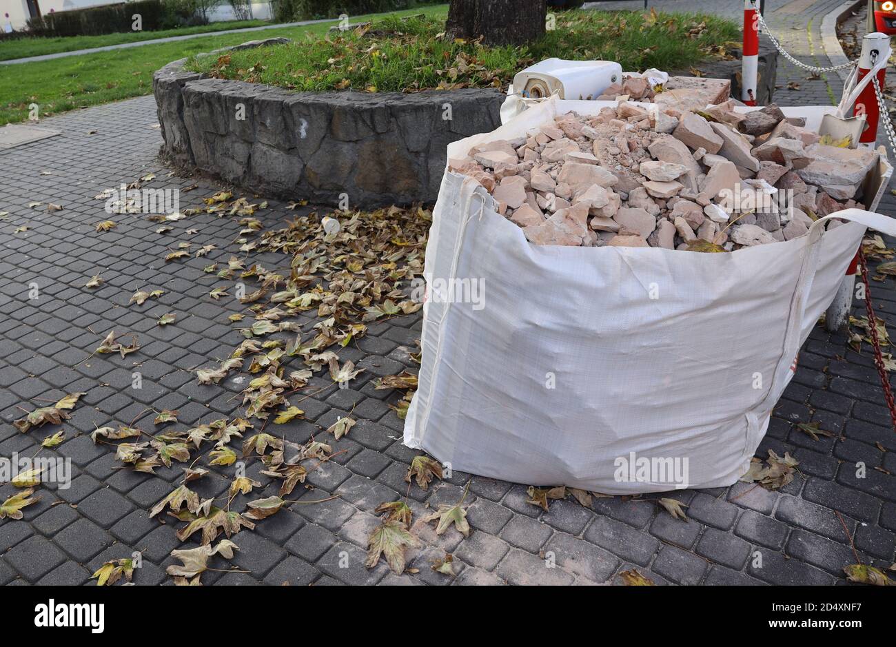 construction waste neatly collected in special garbage bag on the ...