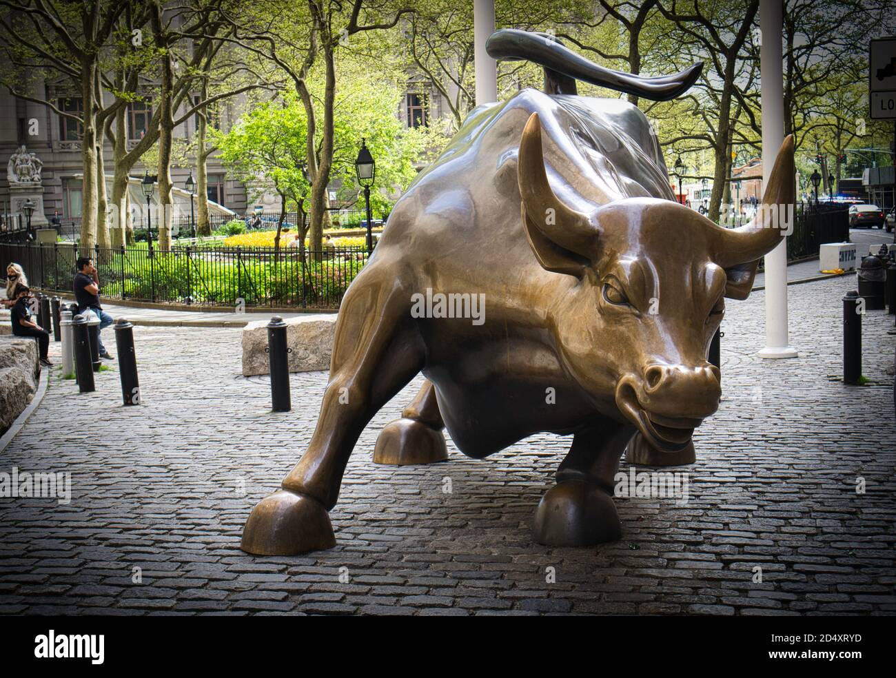 Wall Street stock exchange charging metal bull in NYC Manhattan lower financial district Stock ...