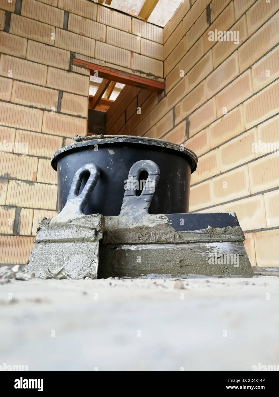 Taping knifes and cement bucket(construction work tools) for ...