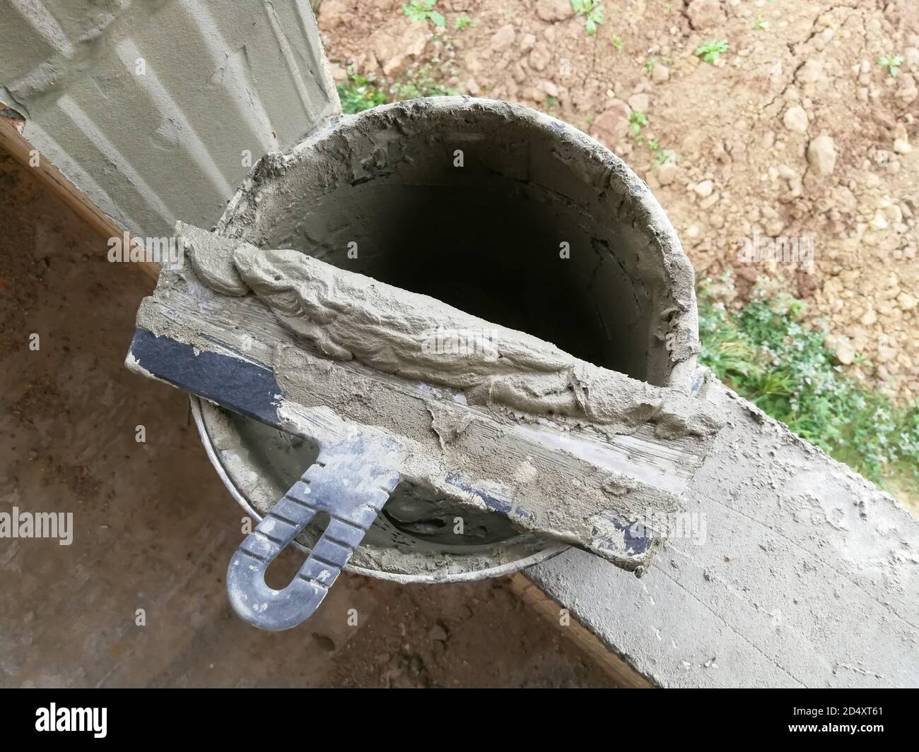 Taping knifes and cement bucket(construction work tools) for ...