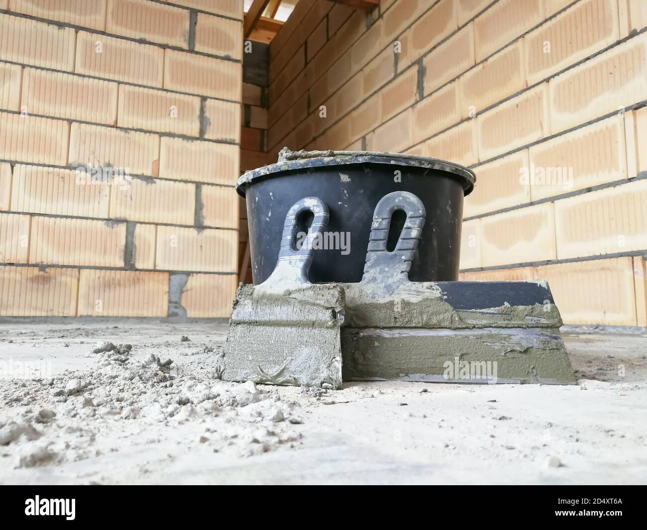 Taping knifes and cement bucket(construction work tools) for ...