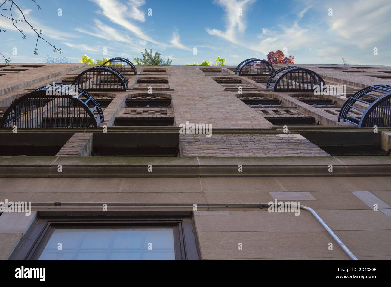 Low angle apartment building with balconies Stock Photo - Alamy