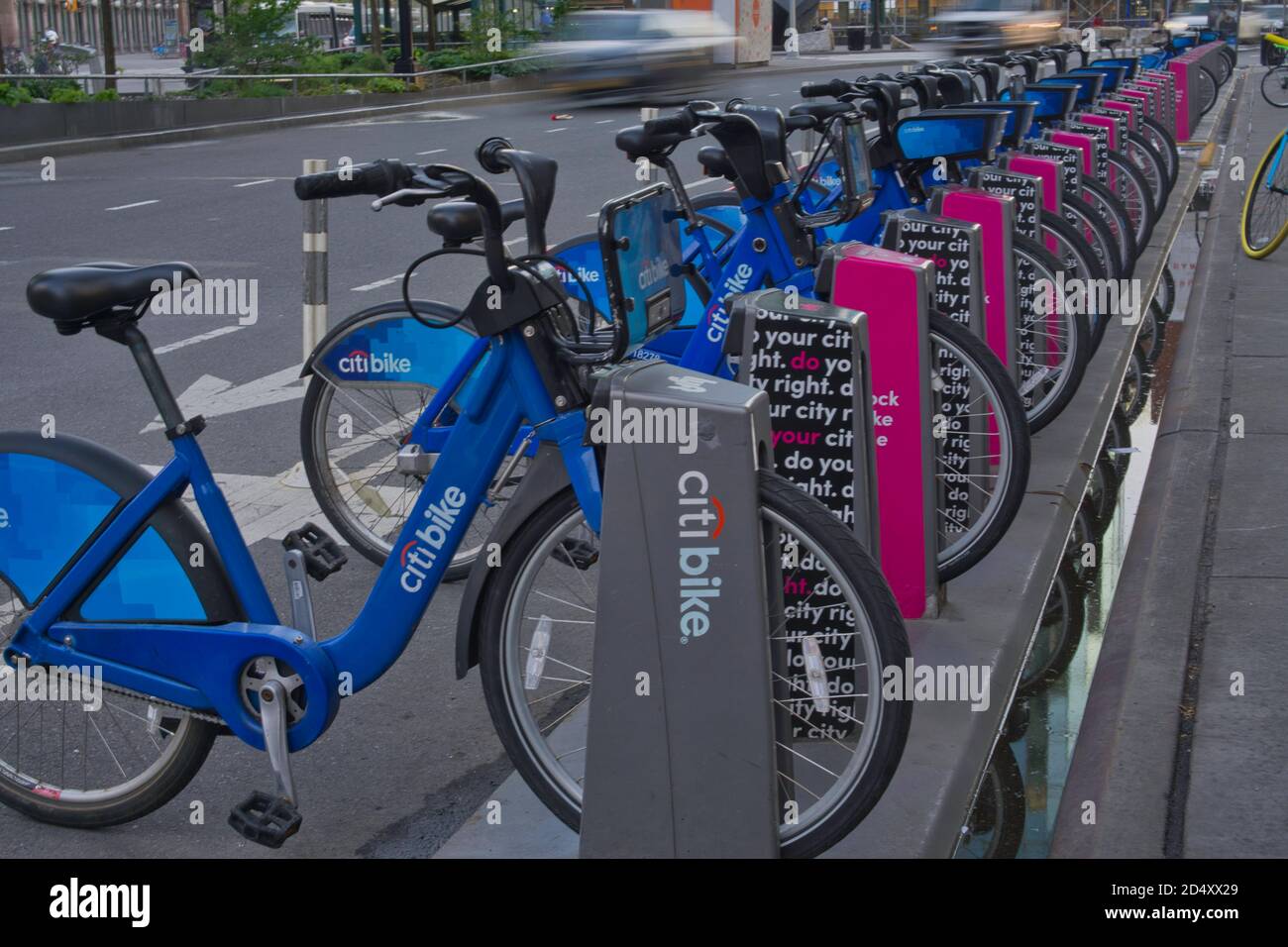 New York, NY / USA - May 3 2020: City bikes parked along the street of ...