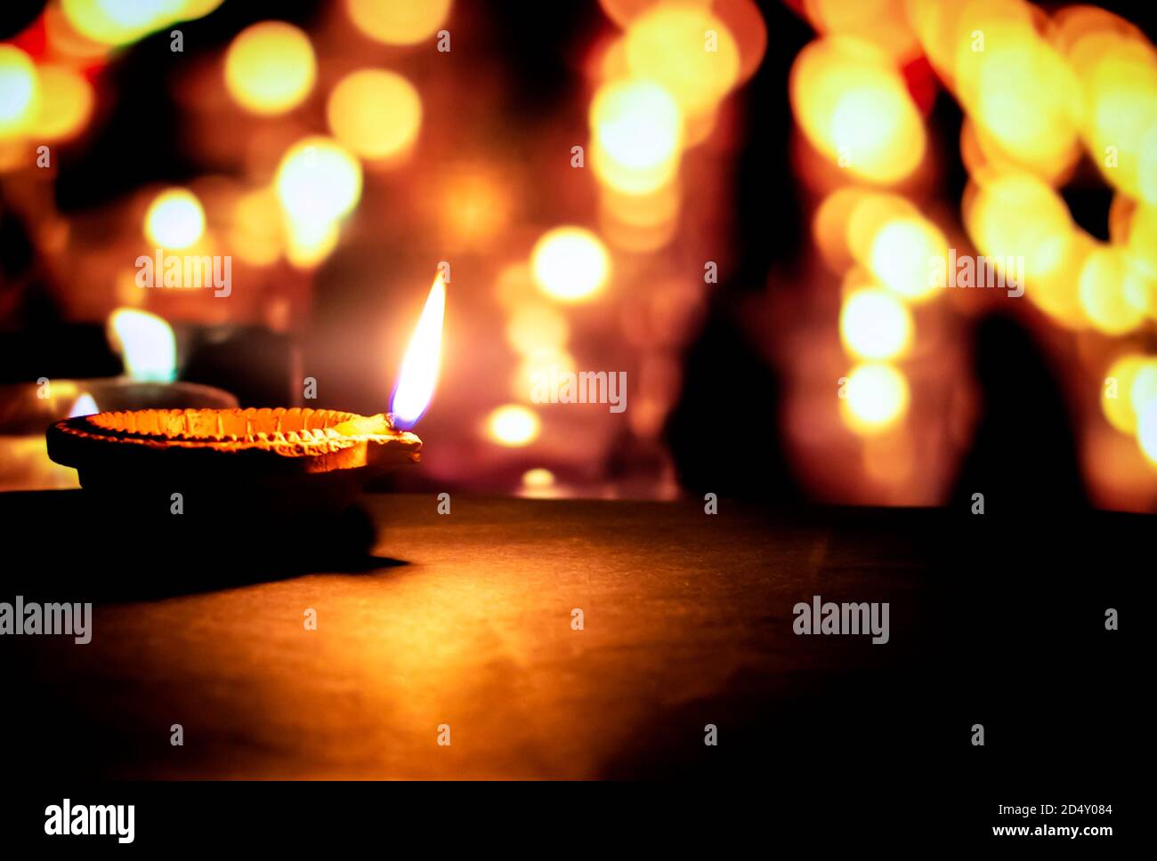 Happy Diwali. Clay diya candle illuminated in Dipavali, Hindu festival ...