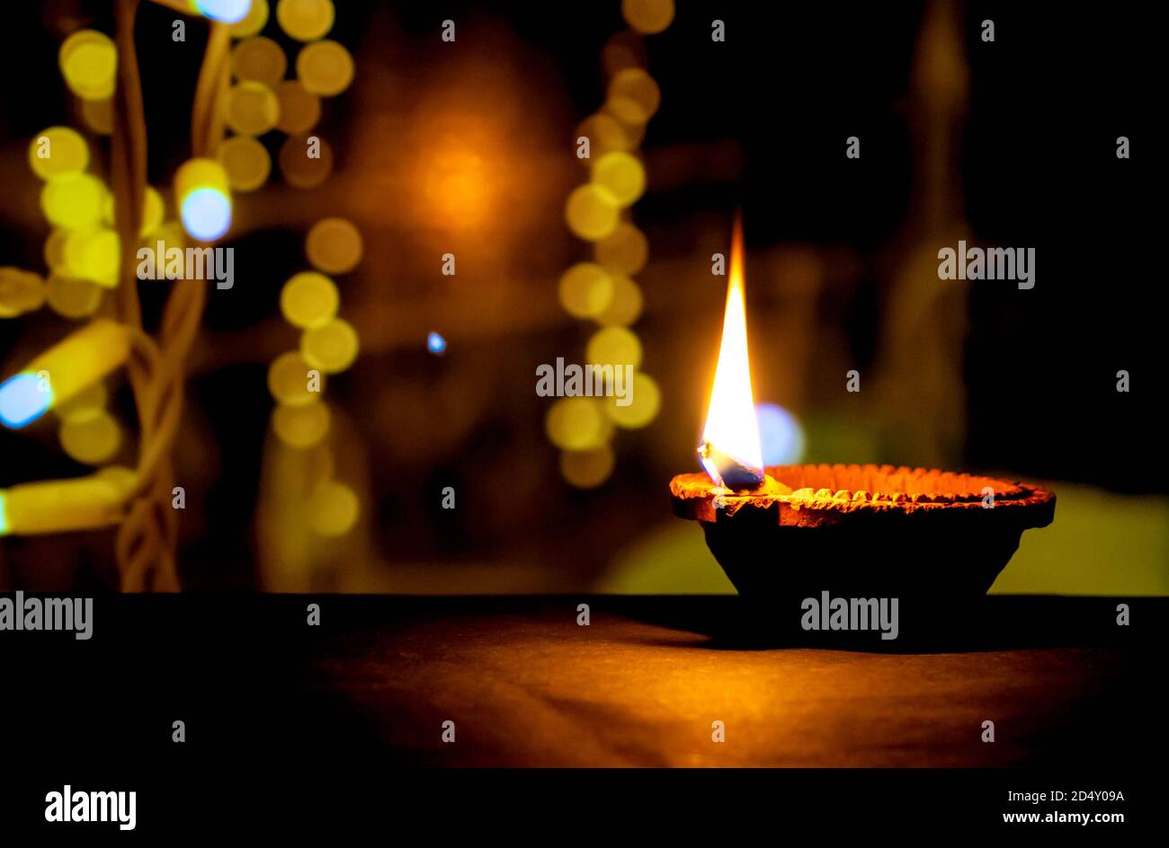 Happy Diwali. Clay diya candle illuminated in Dipavali, Hindu festival ...