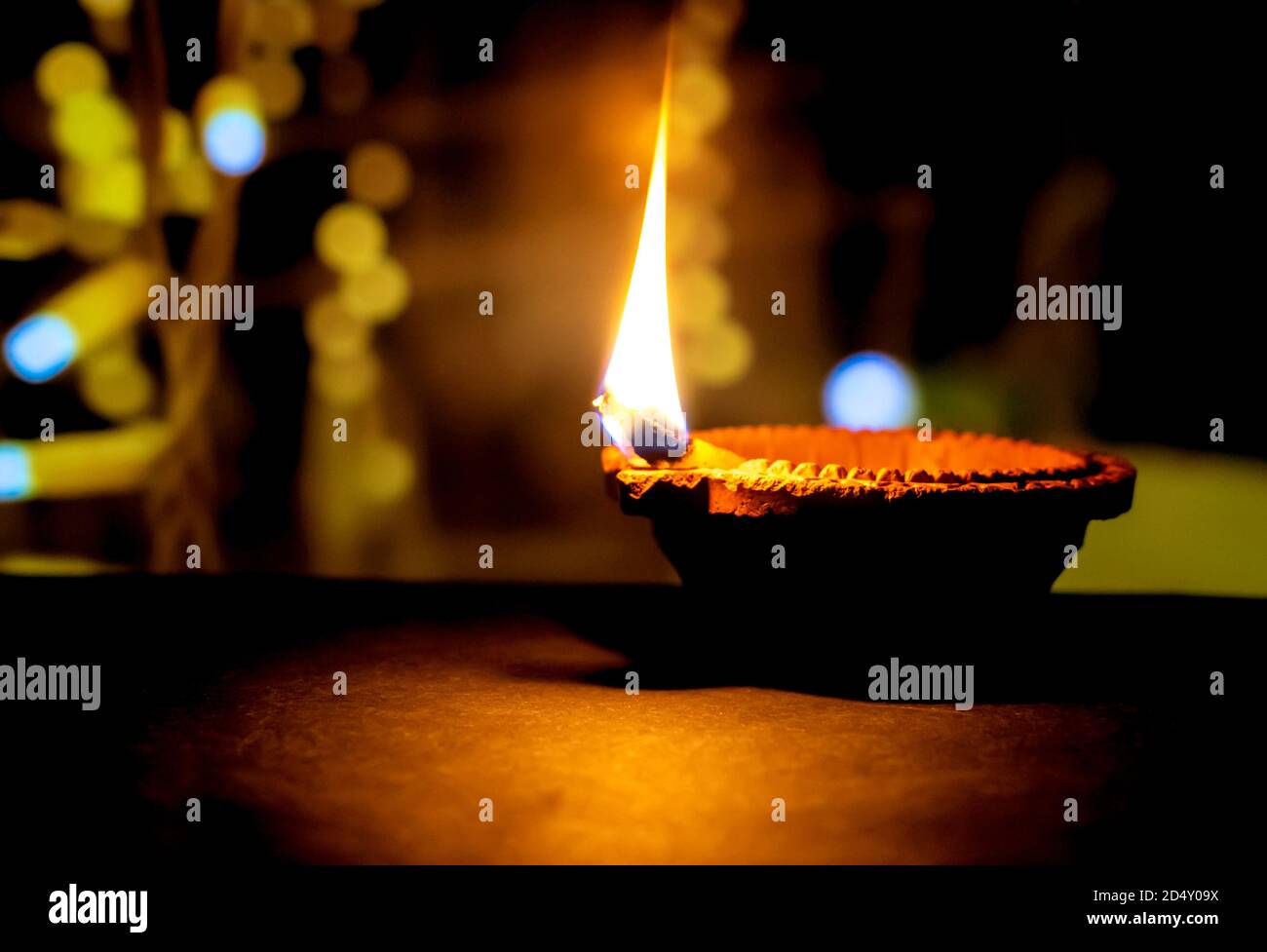 Happy Diwali. Clay diya candle illuminated in Dipavali, Hindu festival ...