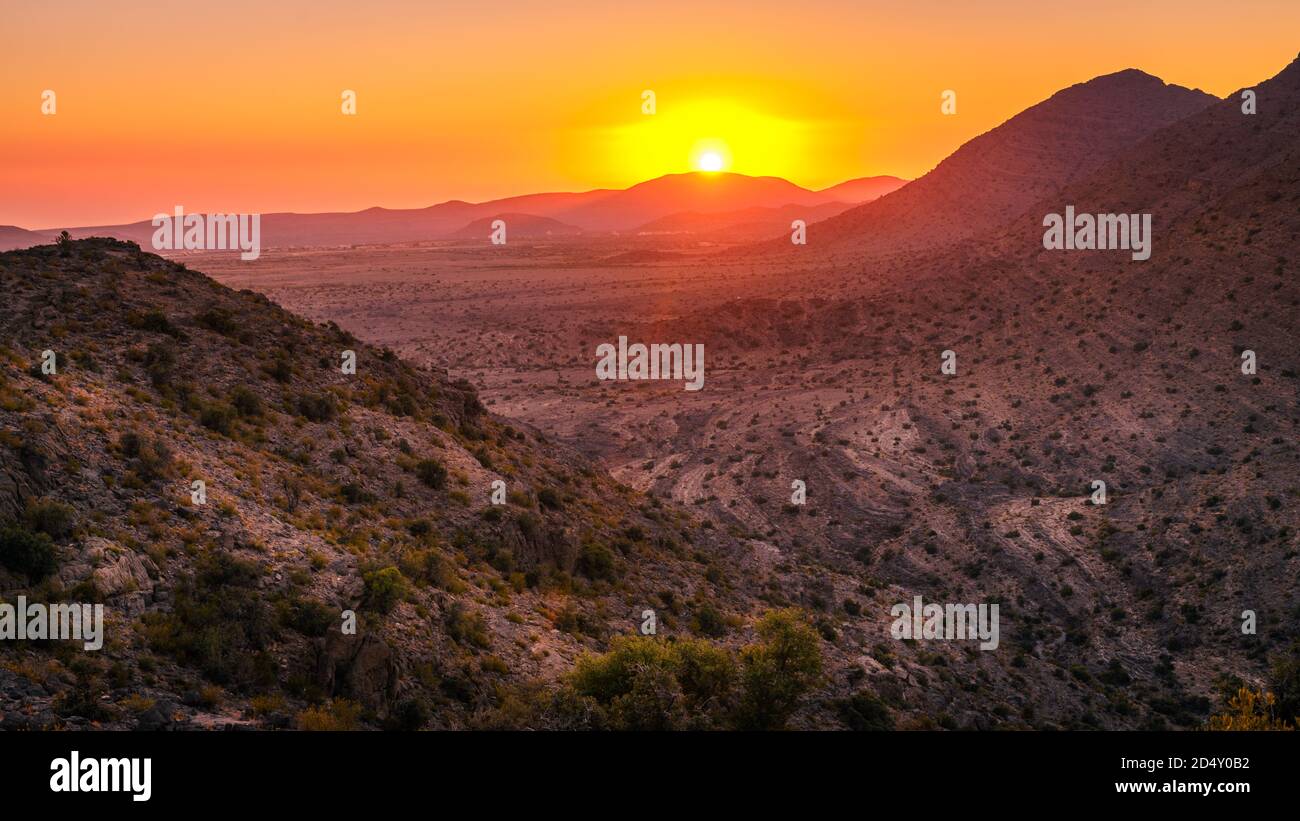 Scenic sunset as seen from Jebel Akhdar (Green Mountain) in Oman Stock ...