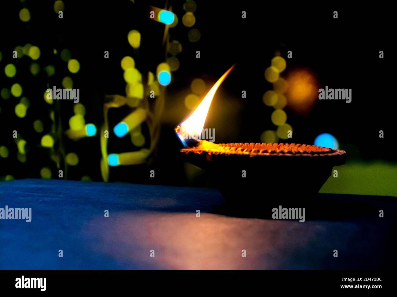 Happy Diwali. Clay diya candle illuminated in Dipavali, Hindu festival ...