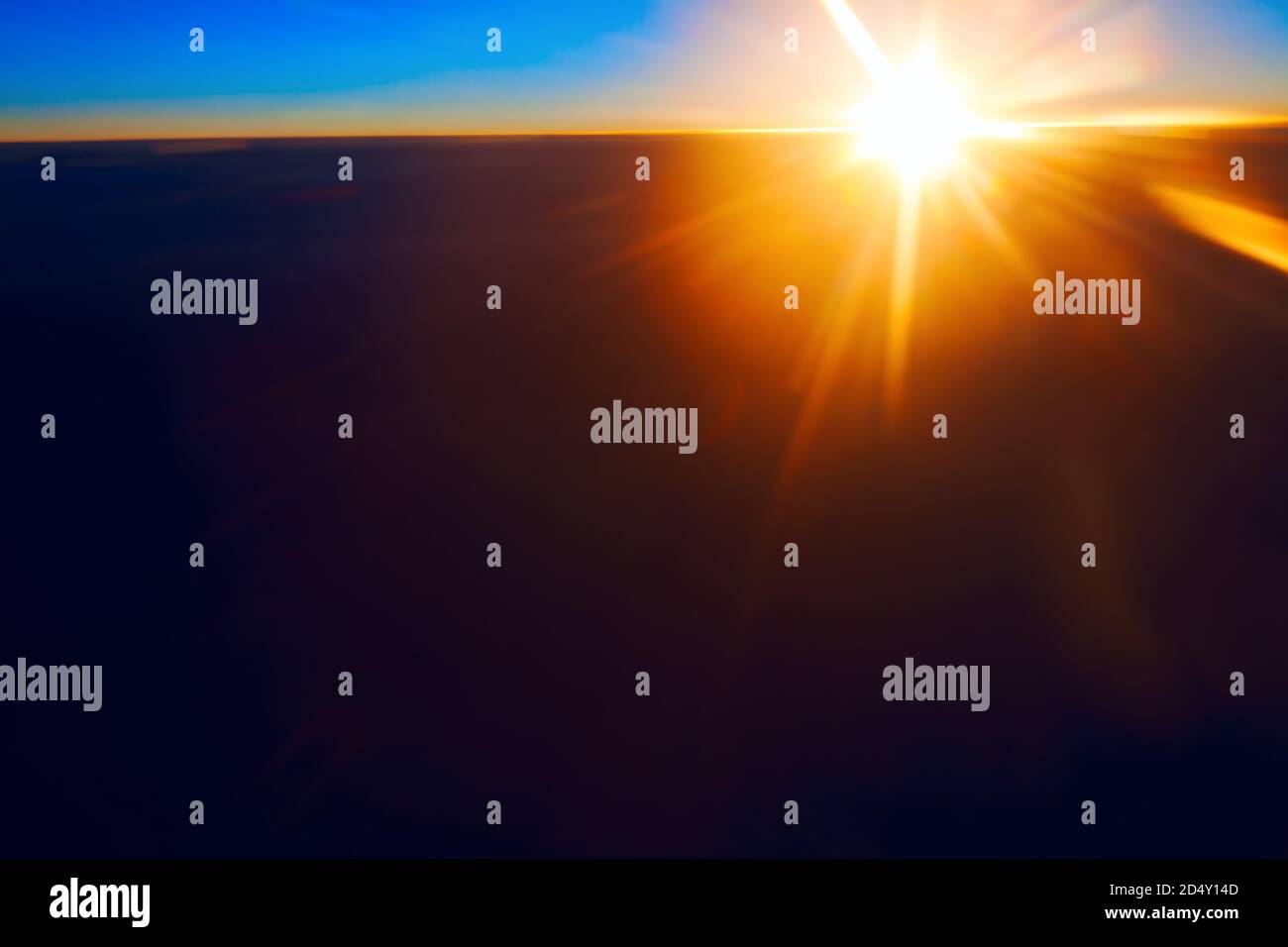 Sun above dark clouds . Fantastic sunlight view from a high height ...