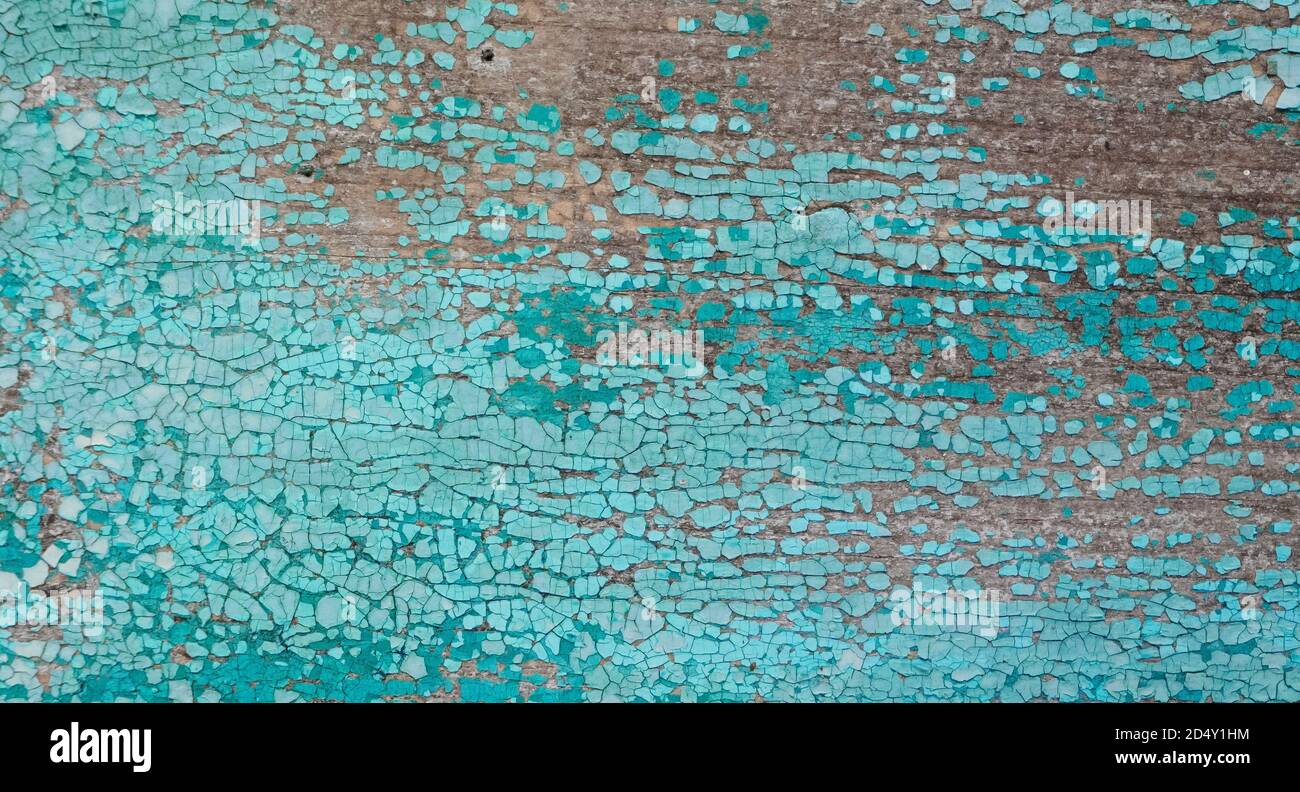 Chipped vintage painted wood background with peeling paint and rough ...