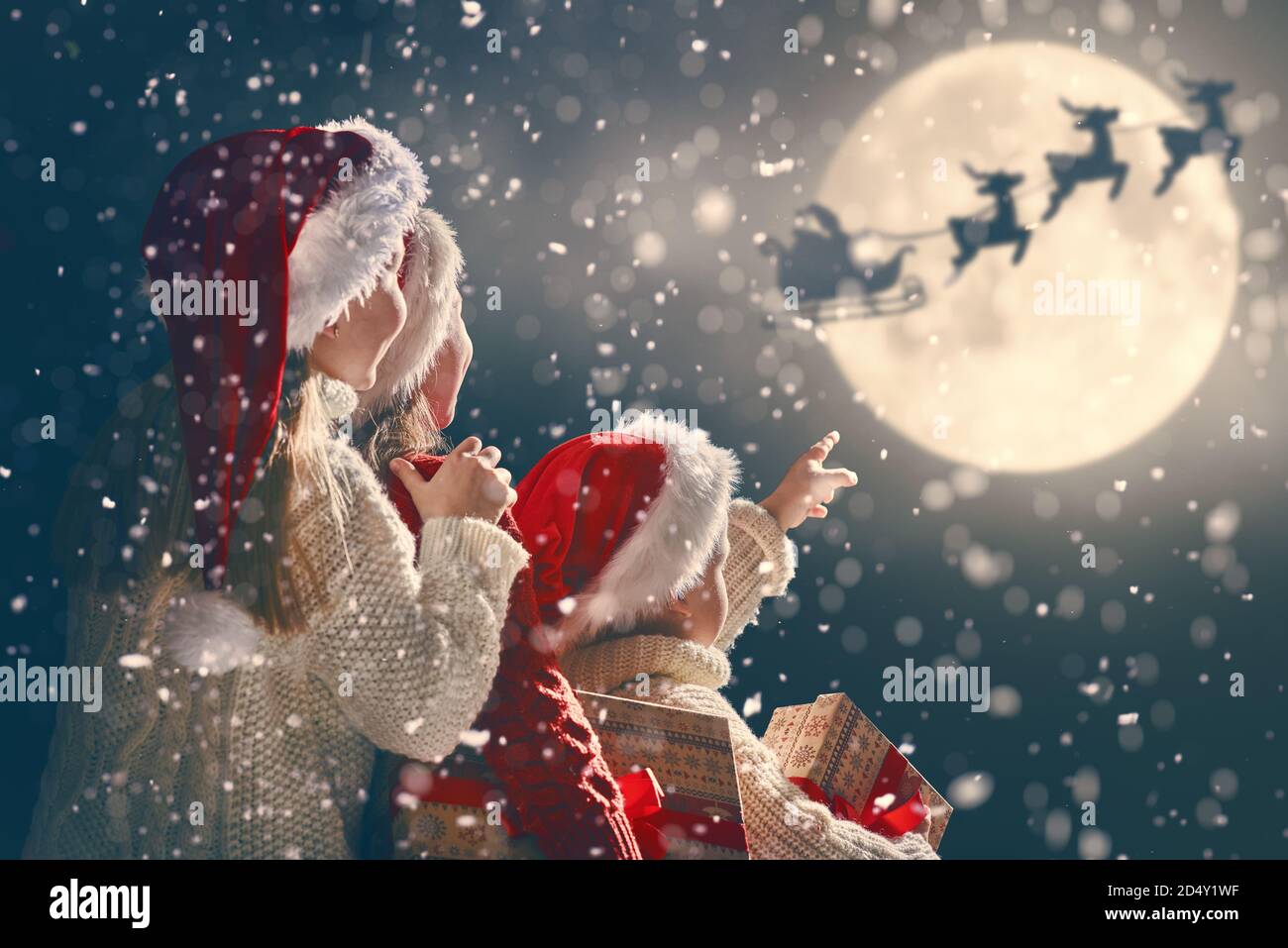 Merry Christmas and happy holidays! Cute little children with xmas ...