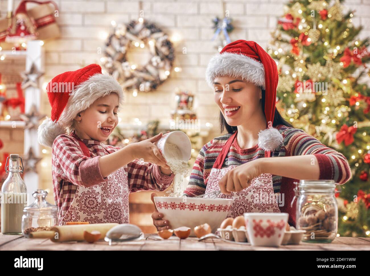 Merry Christmas and Happy Holidays. Family preparation holiday food ...