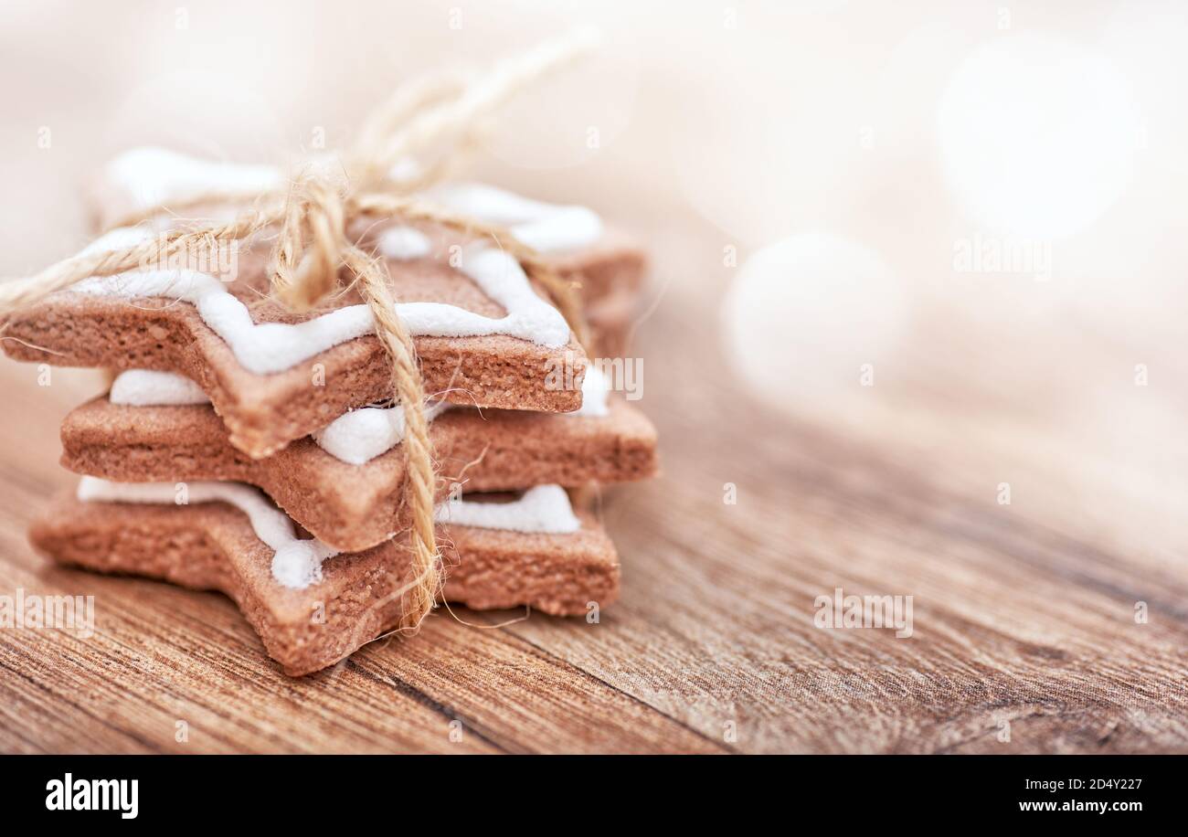 Gingerbread on wooden background Stock Photo - Alamy