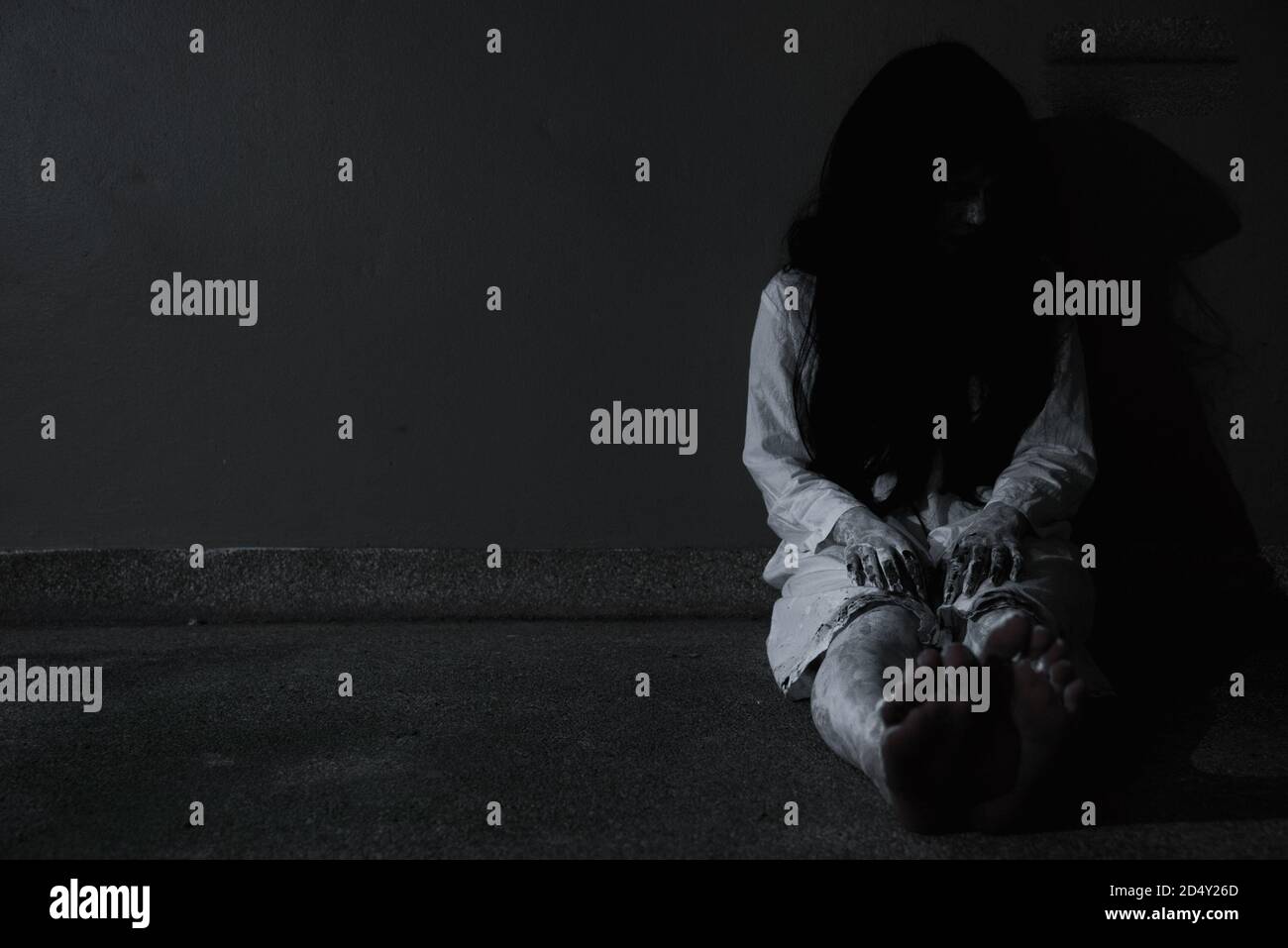 Horror woman ghost creepy sitting at the home, halloween day concept ...