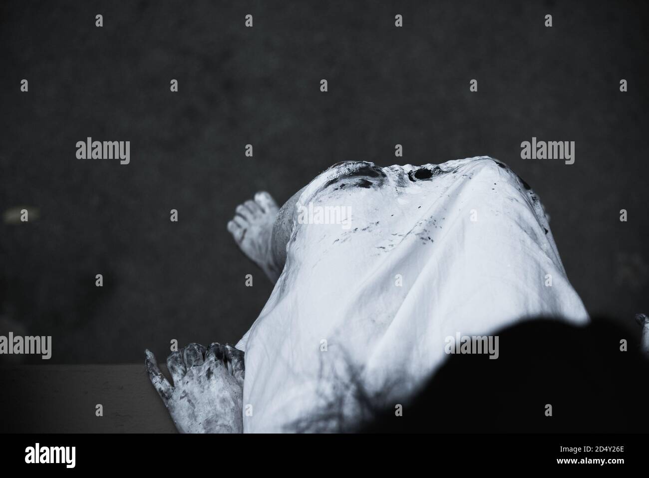 Horror woman ghost creepy sitting hanging legs on building looking down ...