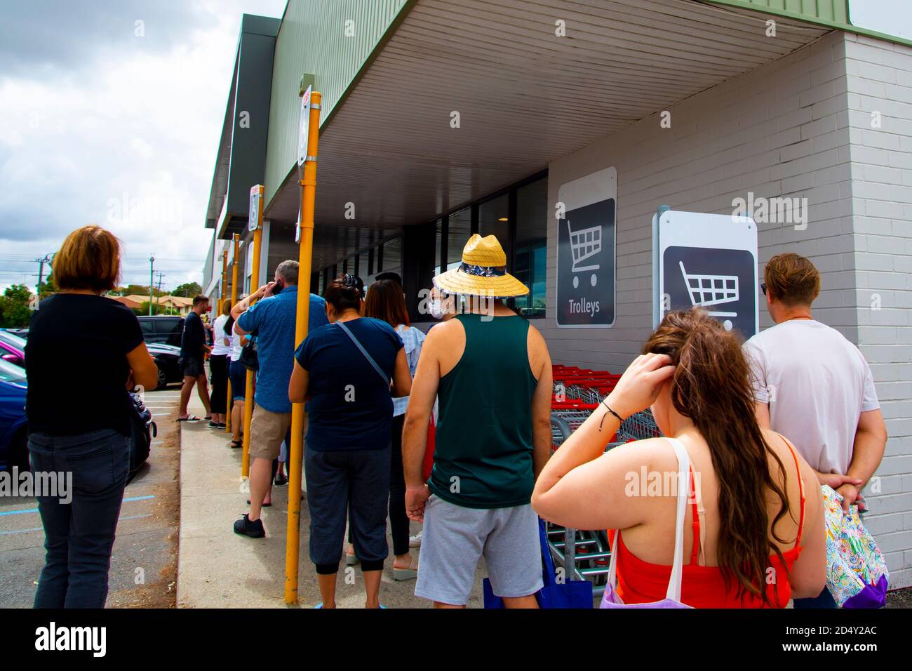 People Queuing at the Grocery Stock Photo - Alamy