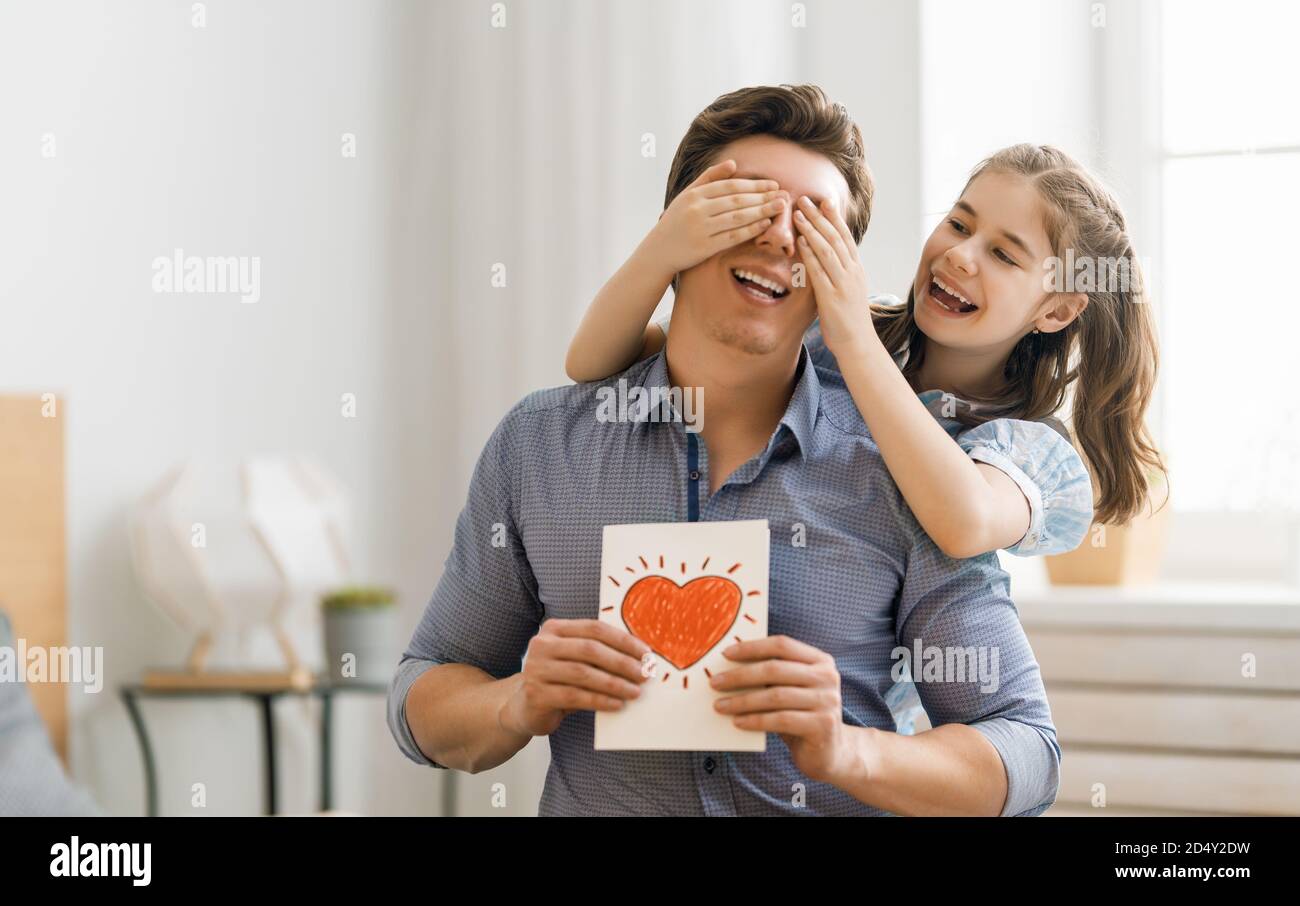Happy father's day! Children daughters congratulating dad and giving ...