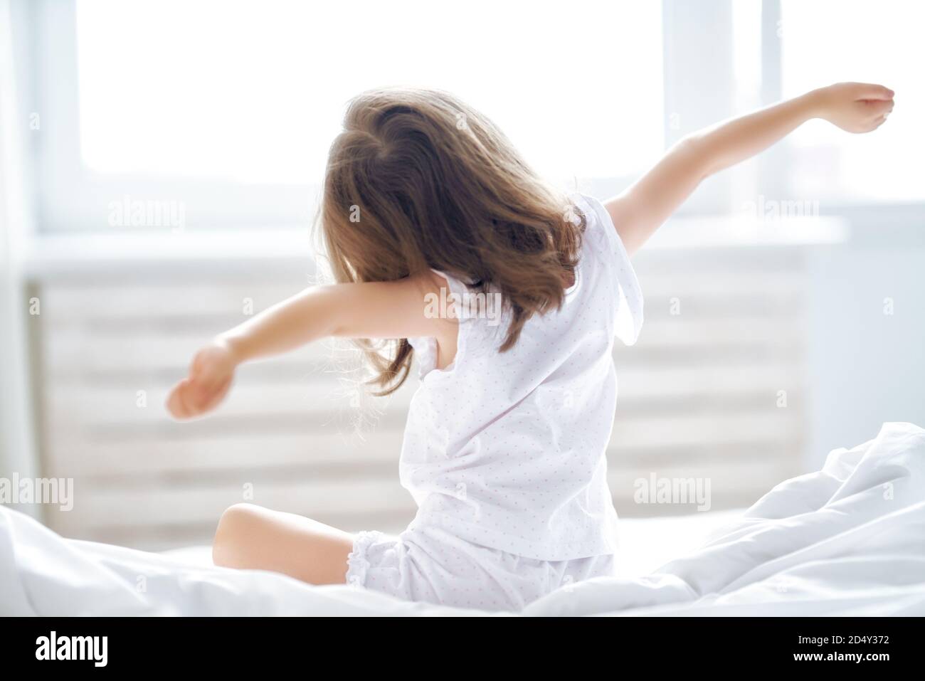 Child waking up sunlight hi-res stock photography and images - Alamy