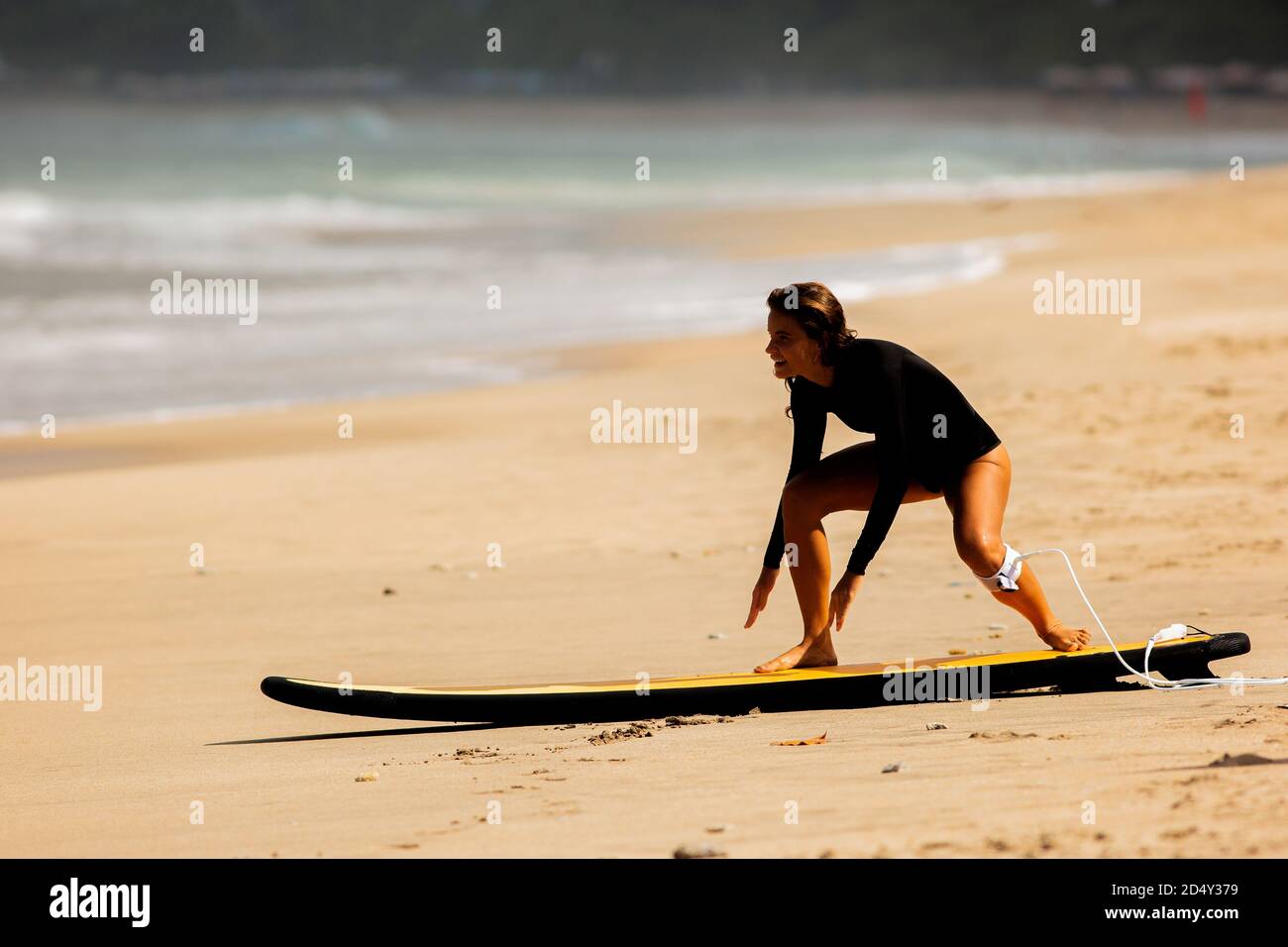 Standing on a surfboard hi-res stock photography and images - Alamy
