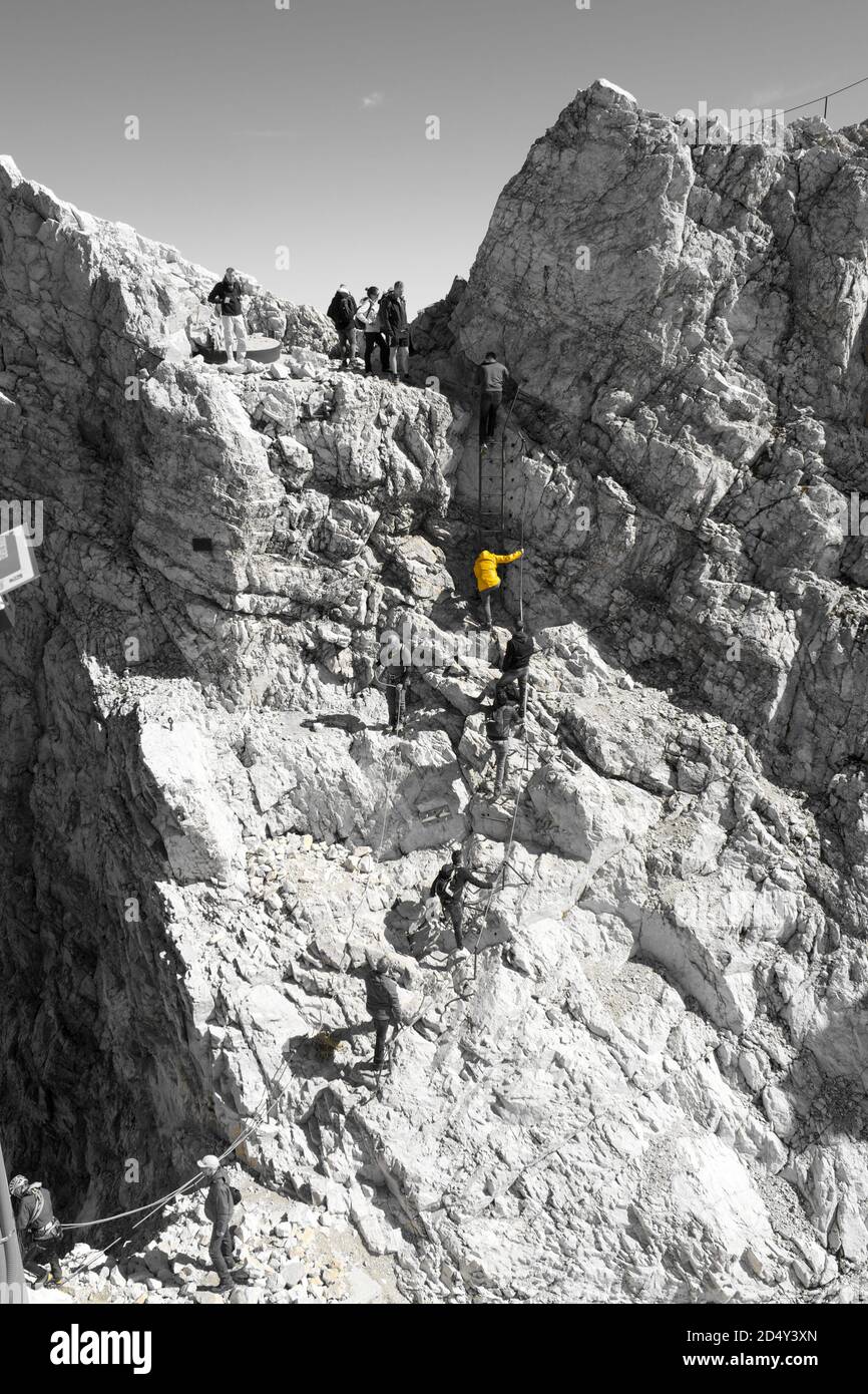People climbing up the mountain Stock Photo - Alamy