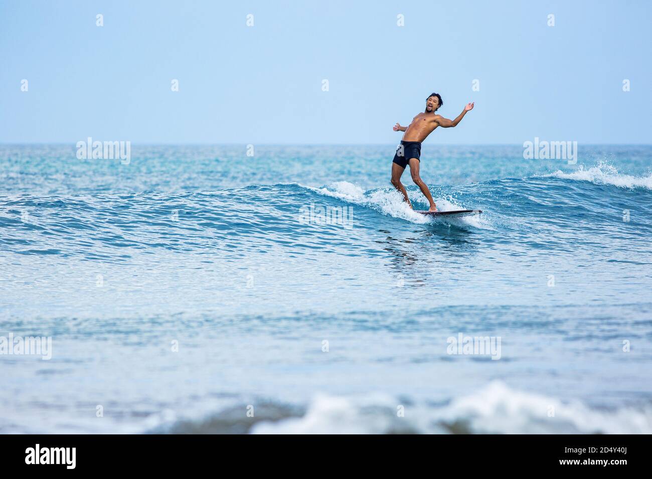 Blue surfer hi-res stock photography and images - Alamy