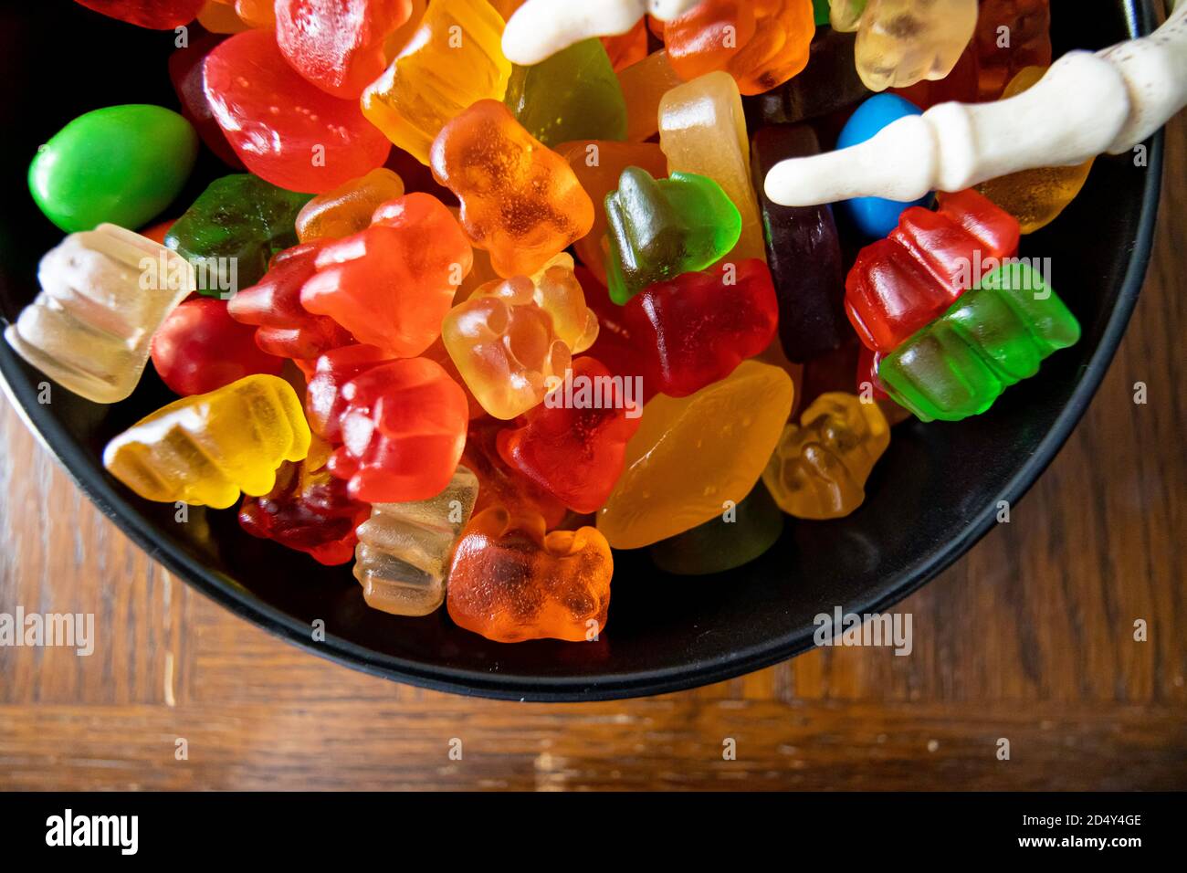 Skeleton Claw hands with Candy and Hand Sanitizer - Halloween Concept ...