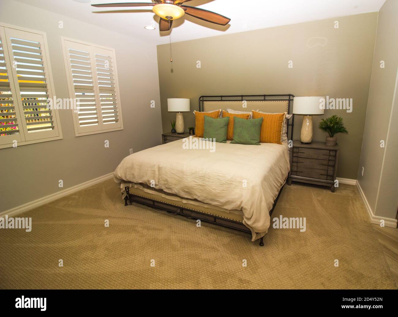 Master Bedroom With Bed, Night Stands And Lamps Stock Photo - Alamy
