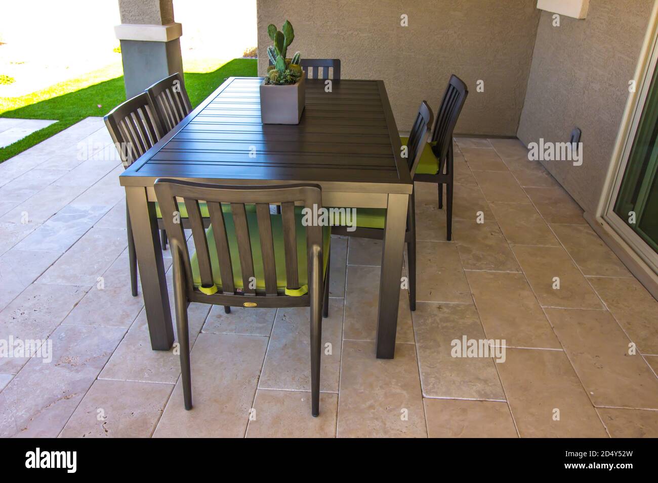 Simple Rear Patio Table With Six Chairs Stock Photo - Alamy