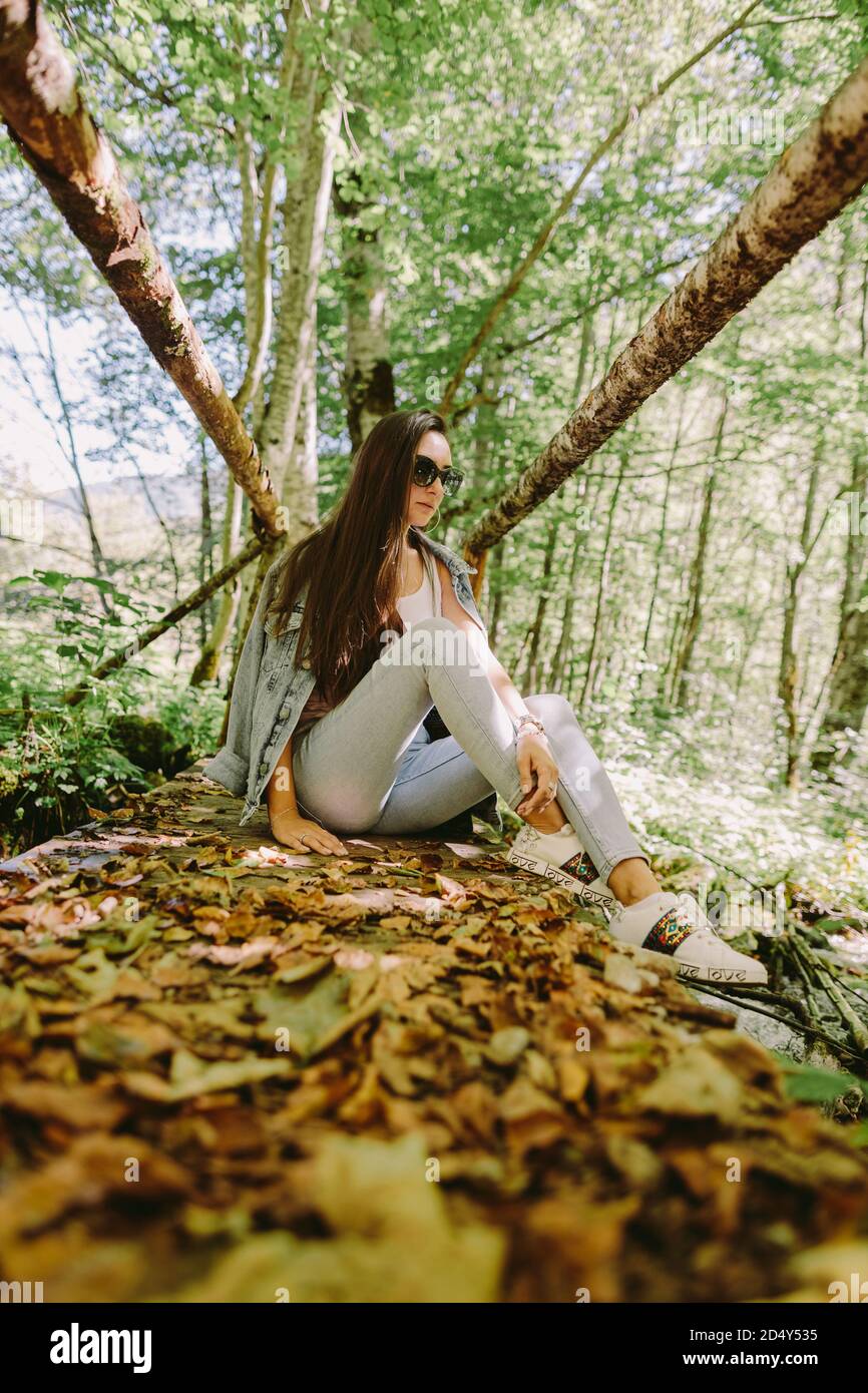 woman relax in autumn forest Stock Photo - Alamy