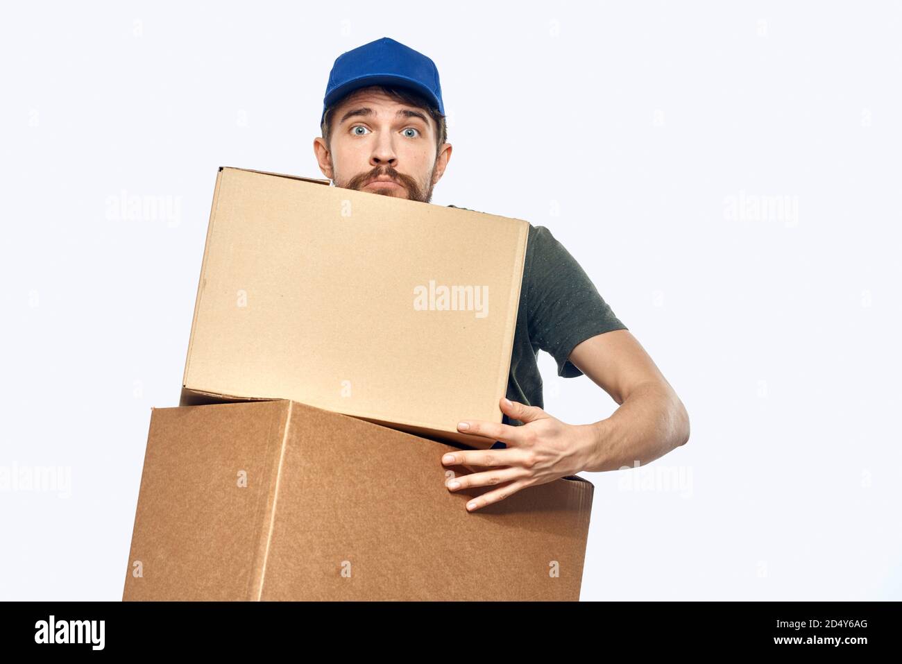 Working man with boxes in hands delivery service work lifestyle Stock ...