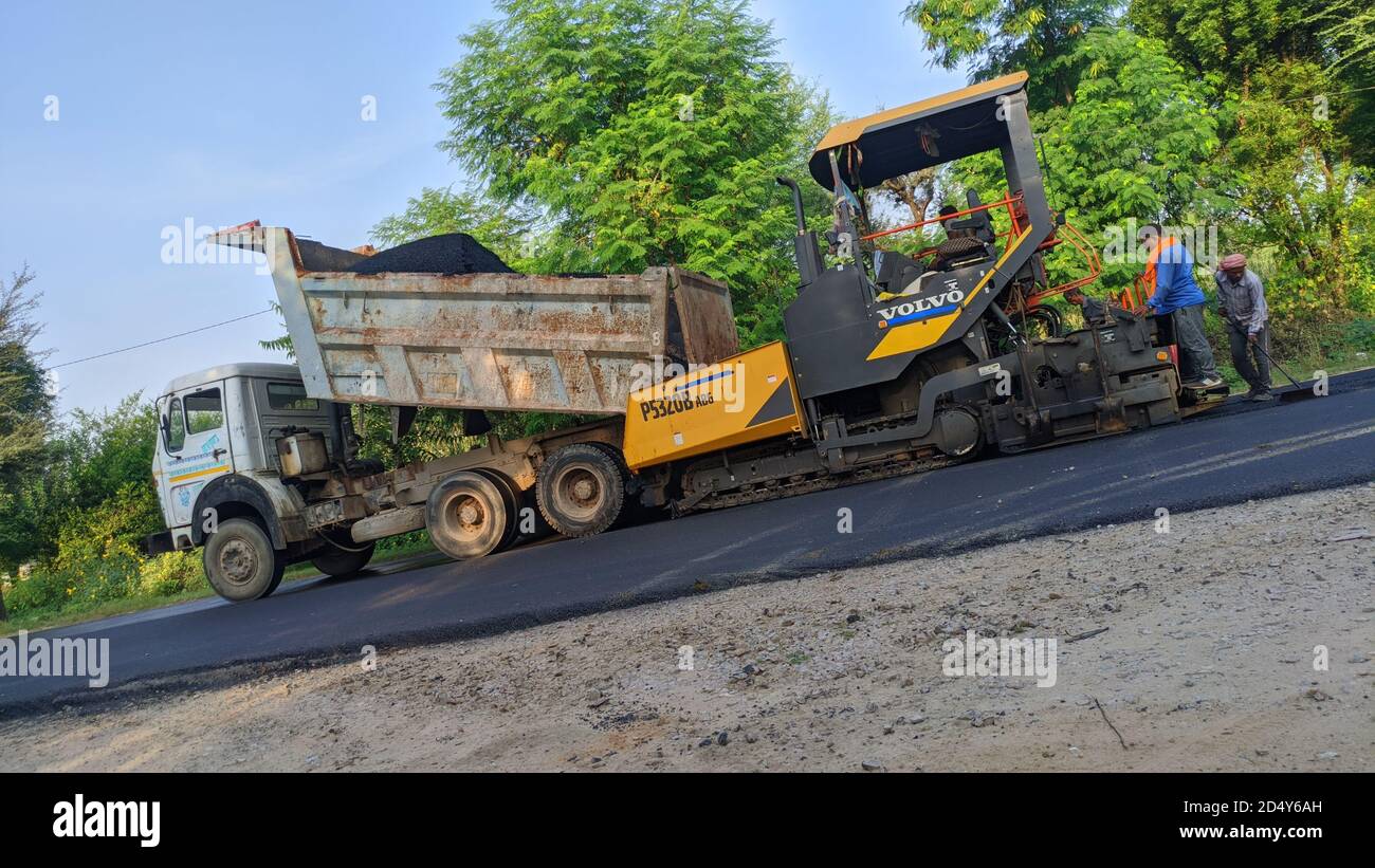 02 October 2020 : Reengus, Jaipur, India / New asphalt road pavement ...