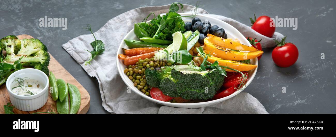 Buddha bowl of mixed grilled vegetables and legumes. Healthy eating concept. Panorama, banner ...