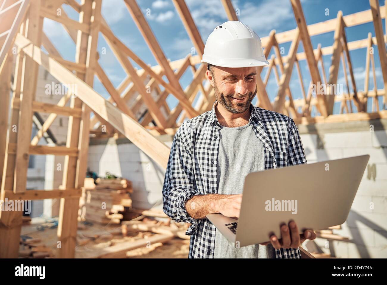 Good-looking man in charge of construction management Stock Photo - Alamy