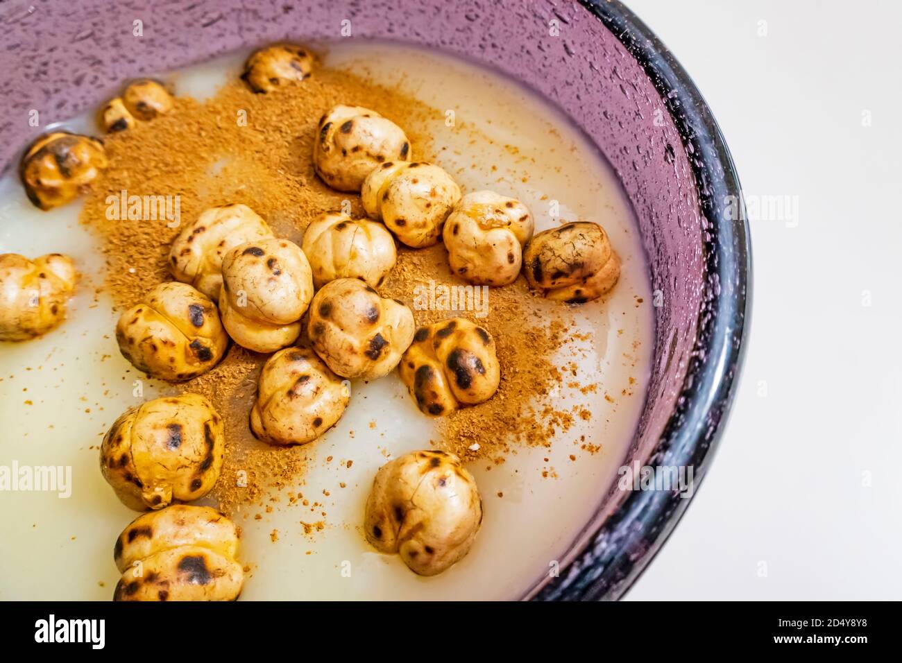 traditional turkish drink boza in glass with cinnamon powder and ...