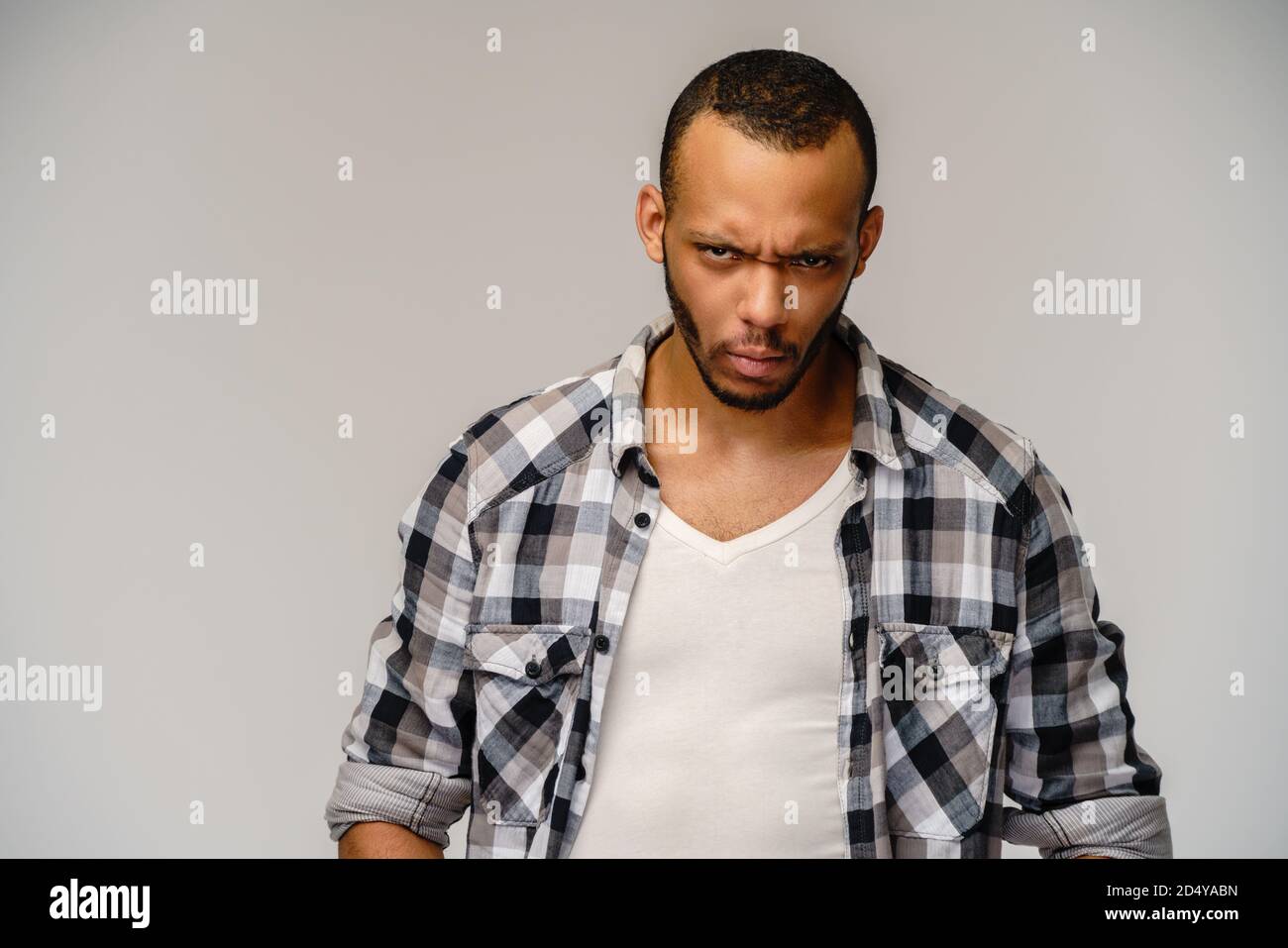 Photo Of Emotional Angry Sad Young African American Man Standing Over