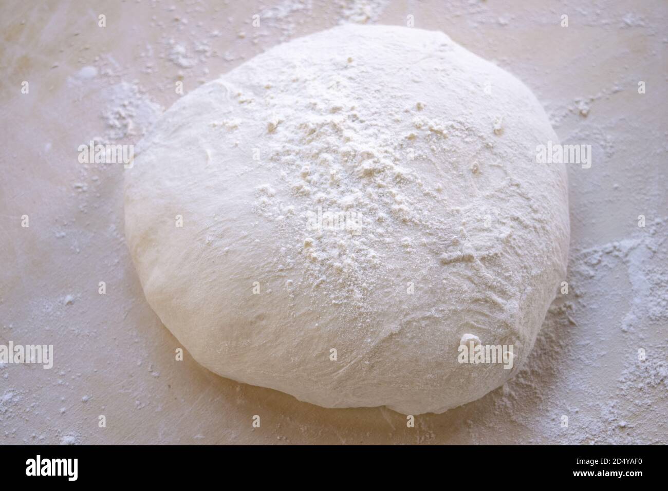 pizza dough during the preparation on a pastry board Stock Photo - Alamy