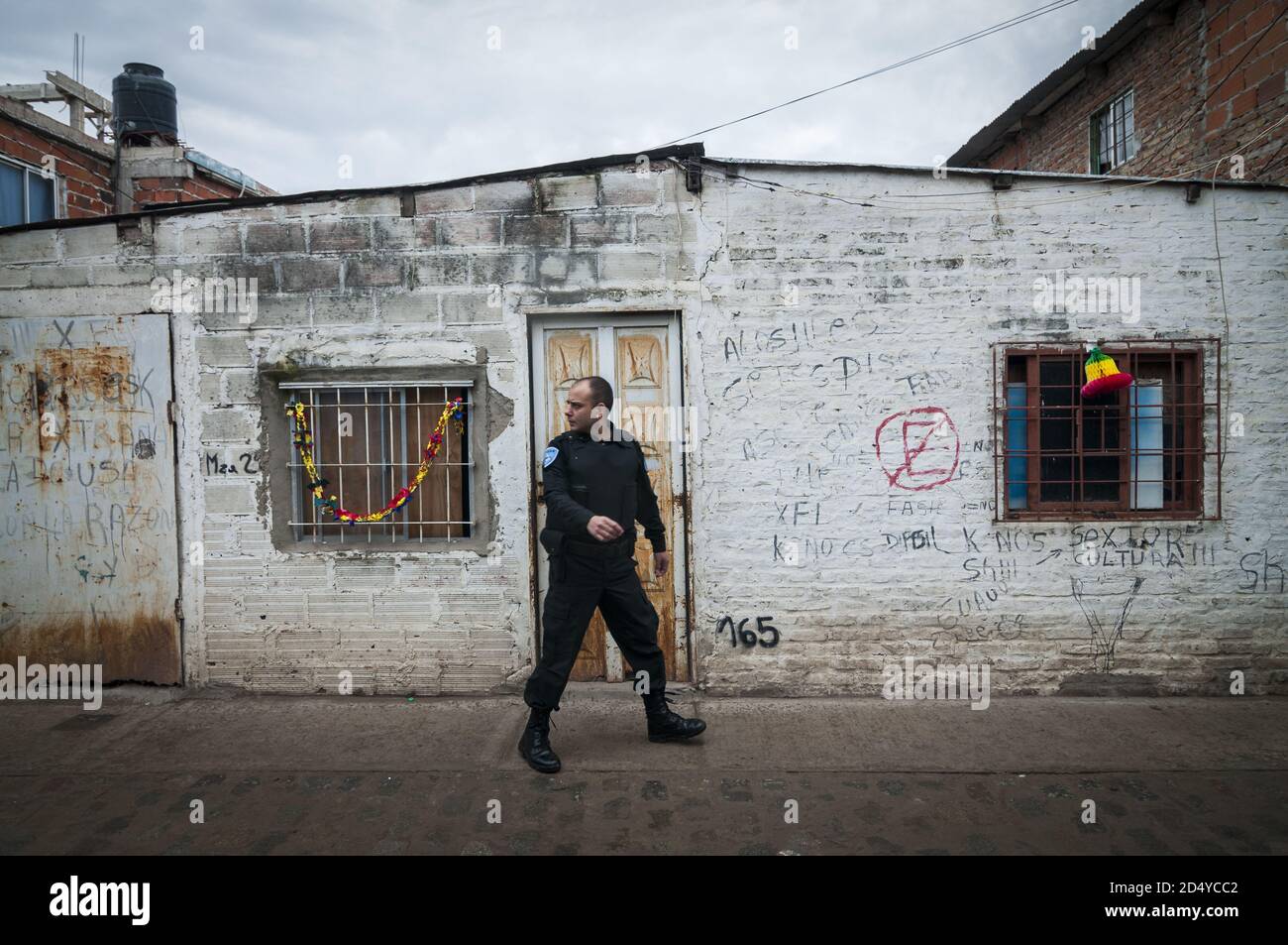 BUENOS AIRES, ARGENTINA - May 12, 2014: A police officer walks through ...