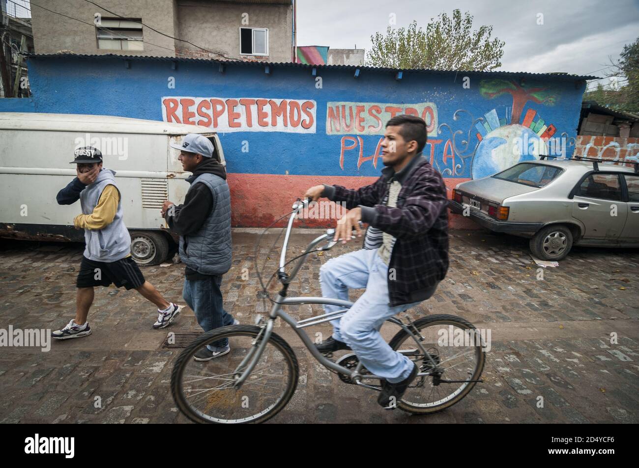 BUENOS AIRES, ARGENTINA - May 12, 2014: A group of teenagers walk ...