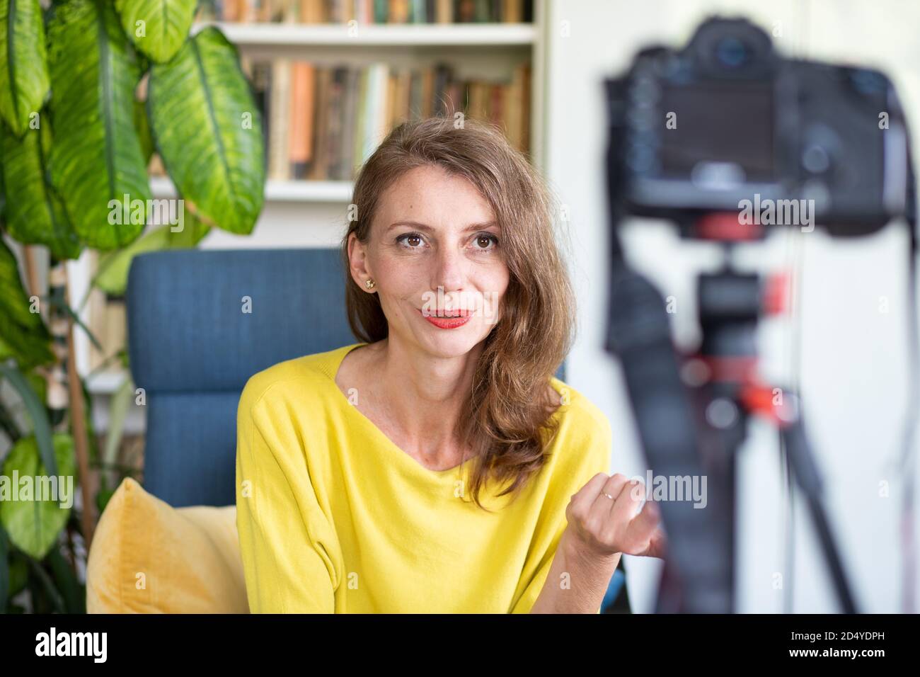 teacher or vlogger recording a lesson on camera online learning Stock ...