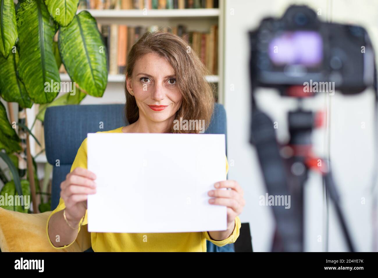 teacher or vlogger recording a lesson on camera online learning Stock ...