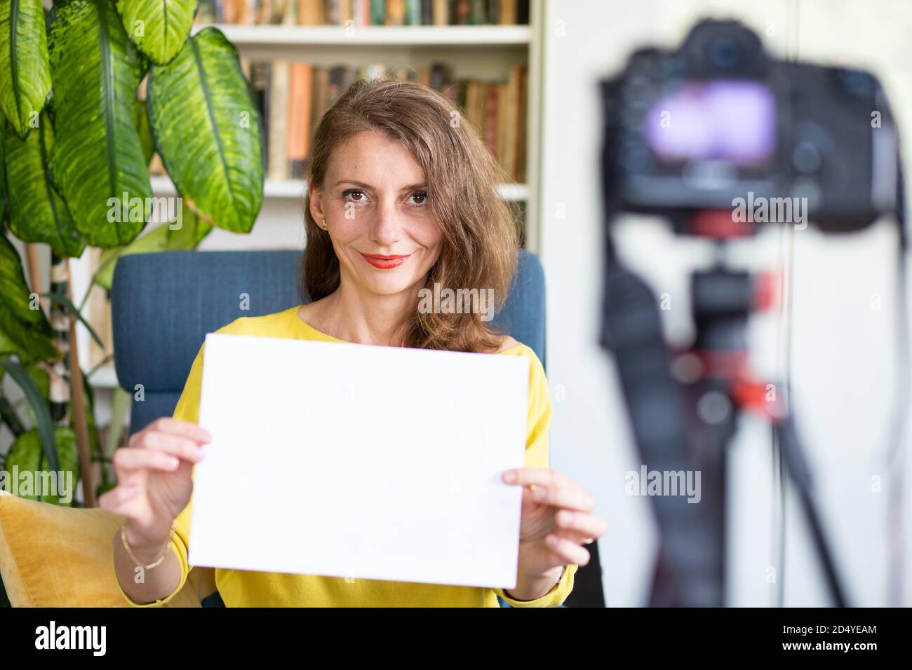teacher or vlogger recording a lesson on camera online learning Stock ...