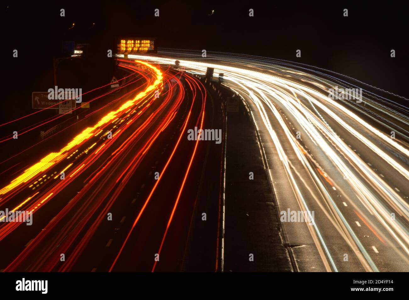 on bridge view of motorway with slow shutter speed Stock Photo - Alamy
