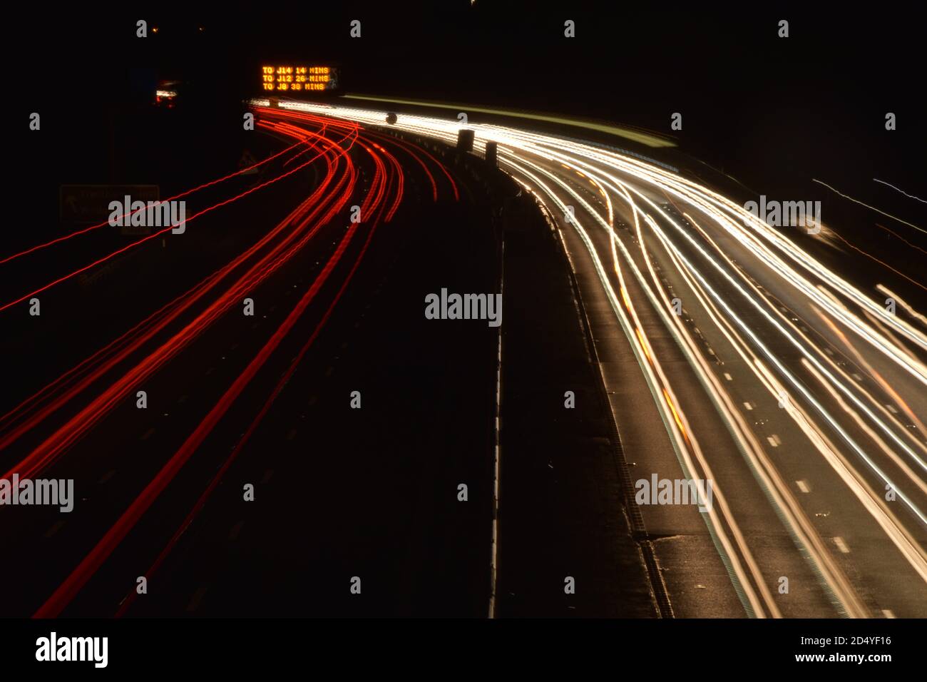 on bridge view of motorway with slow shutter speed Stock Photo - Alamy