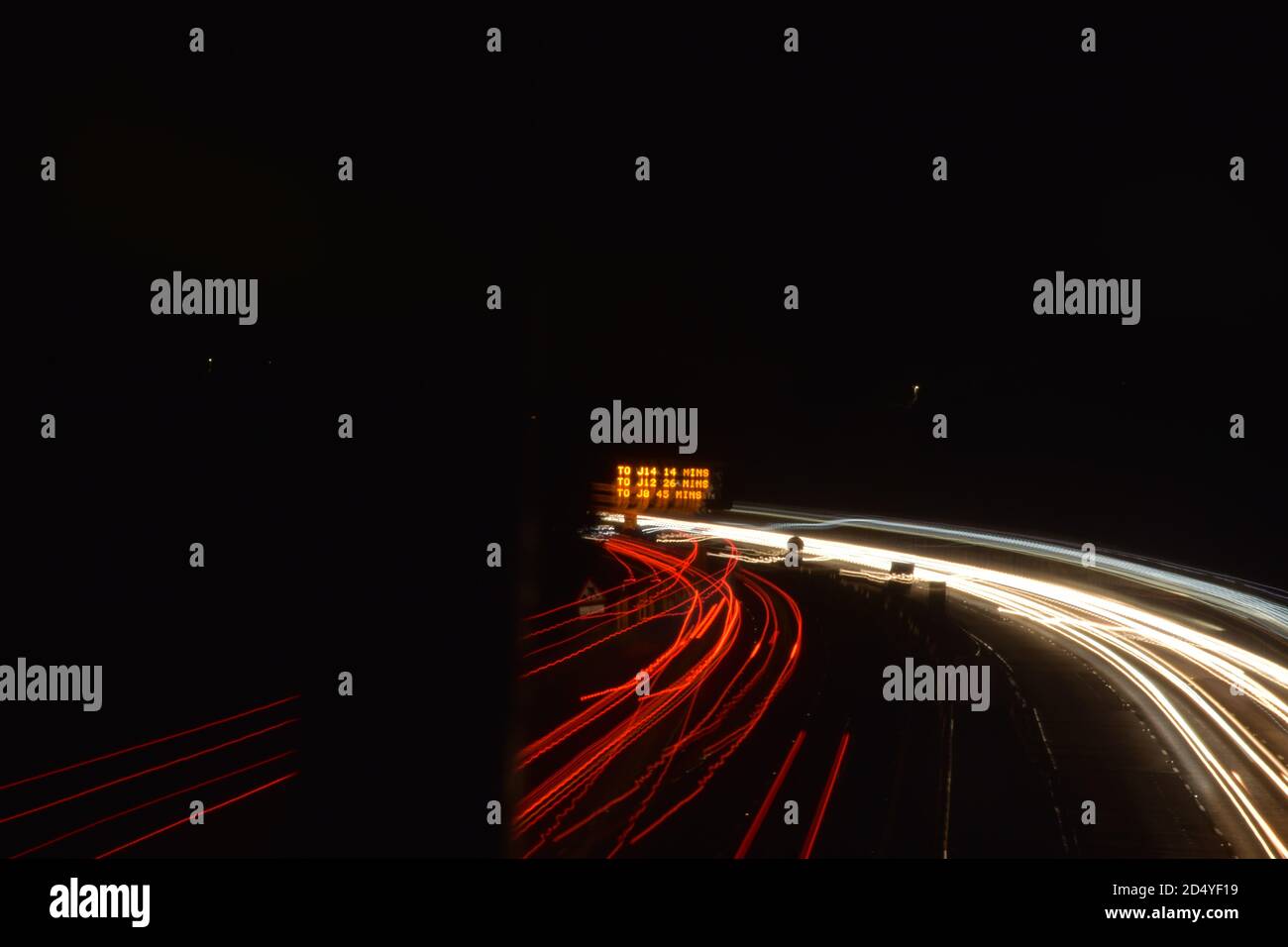 on bridge view of motorway with slow shutter speed Stock Photo - Alamy